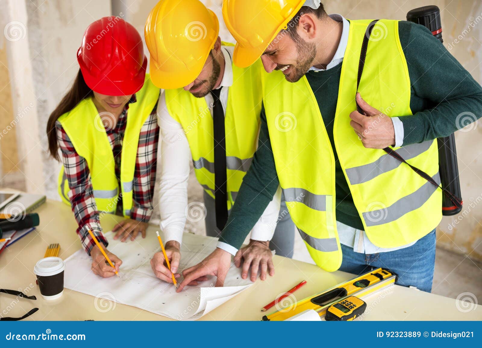 Three Arhitects Working Together on Construction Site Project Stock ...