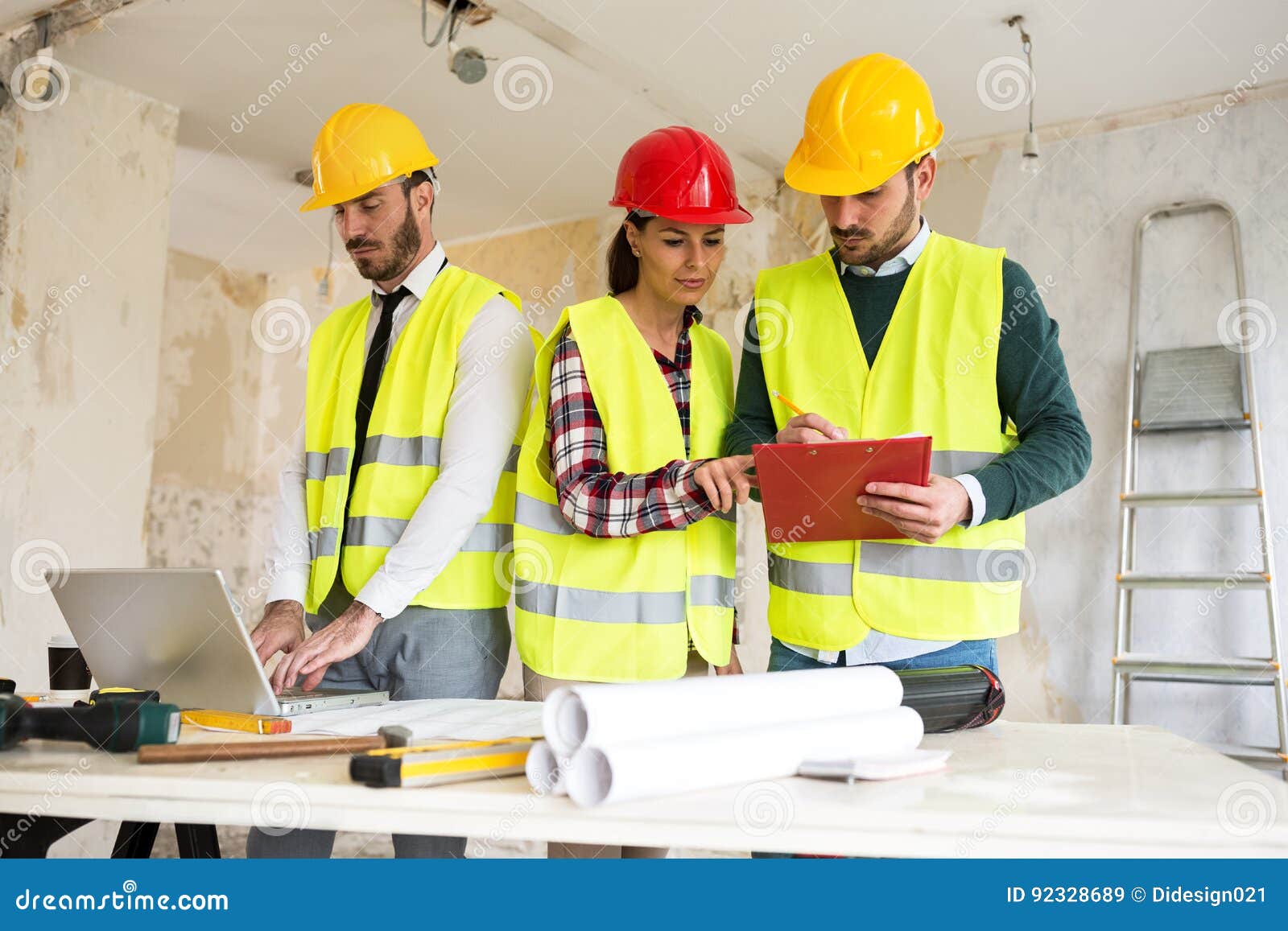 Three Arhitects Working Together on Construction Site Project Stock ...