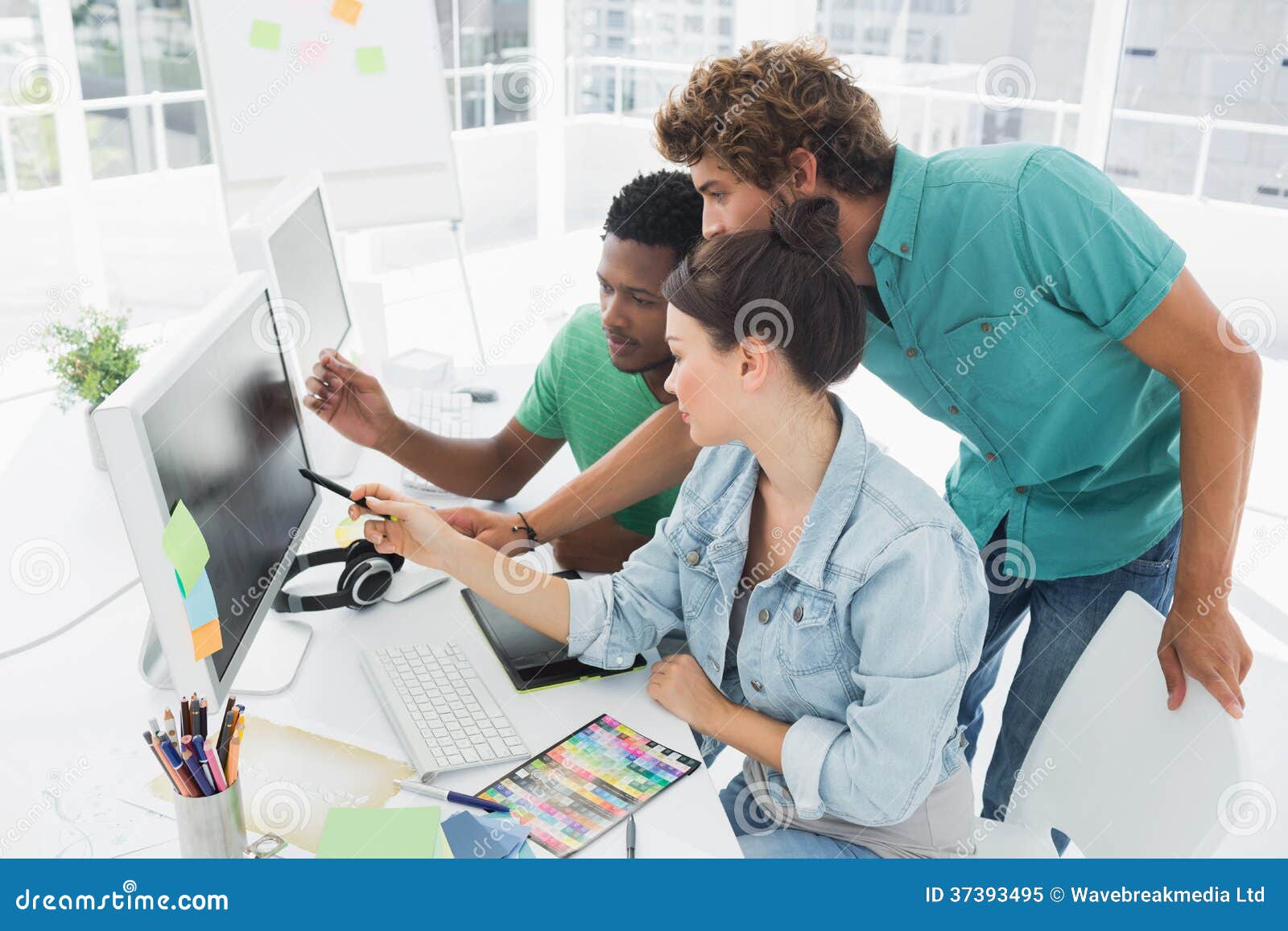 Three Artists Working on Computer at Office Stock Image - Image of ...