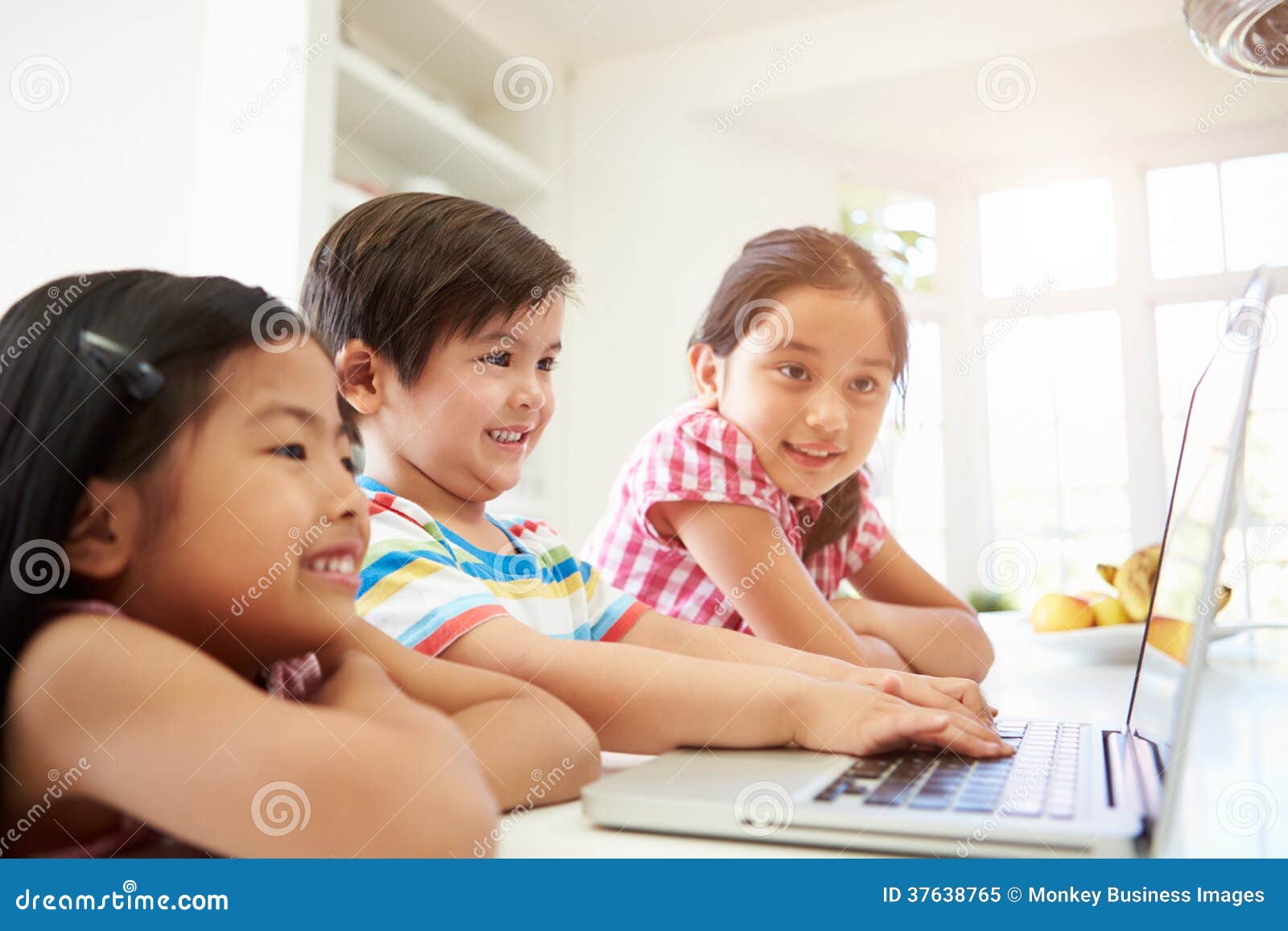 Three Asian Children Using Laptop at Home Stock Image - Image of male ...