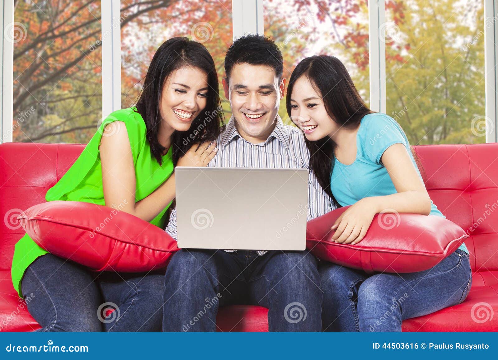 Three Asian People Using Laptop Stock Photo - Image of cheerful, people ...