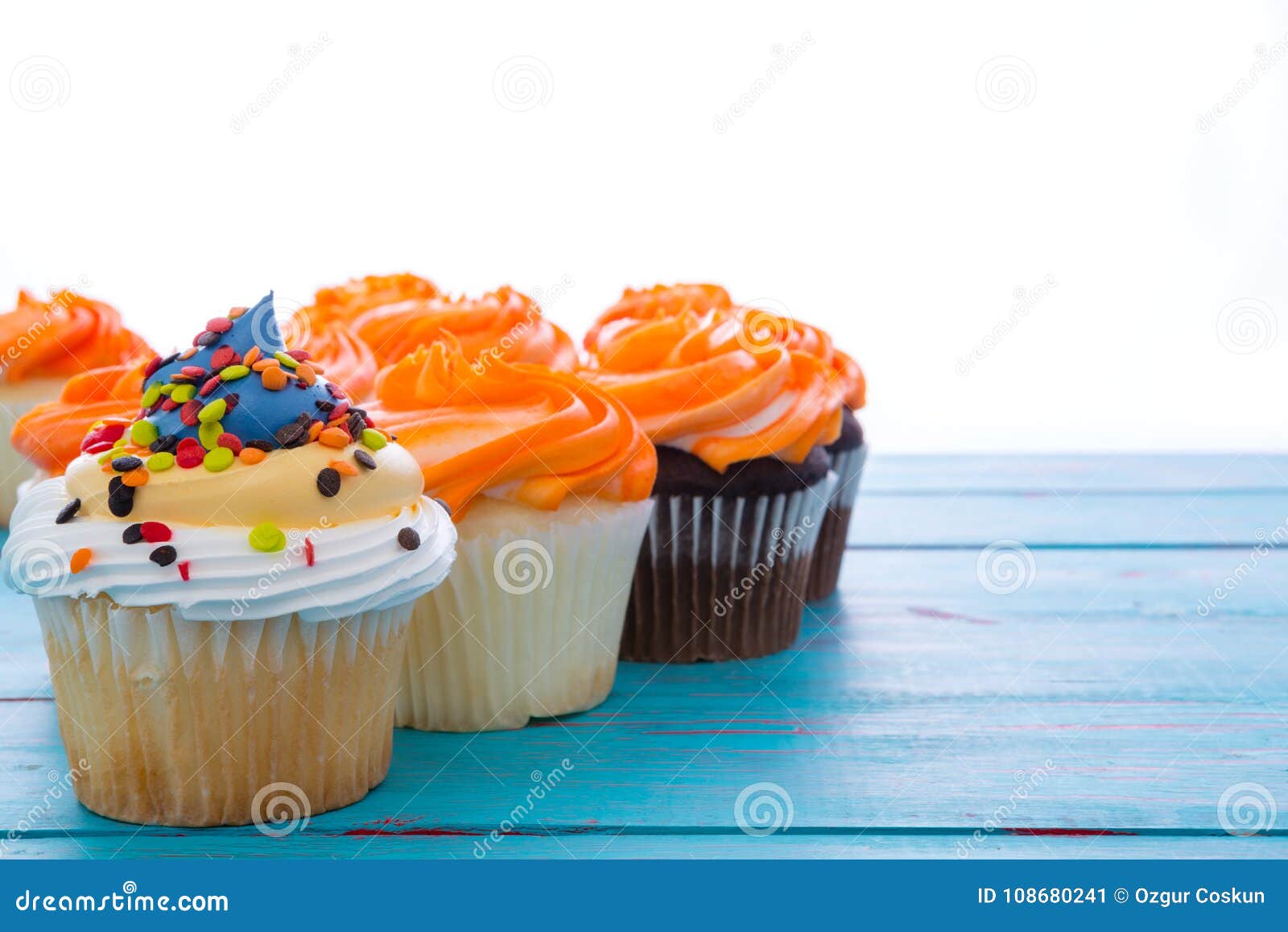 Three Assorted Iced Cupcakes in a Row Stock Image - Image of bakery ...