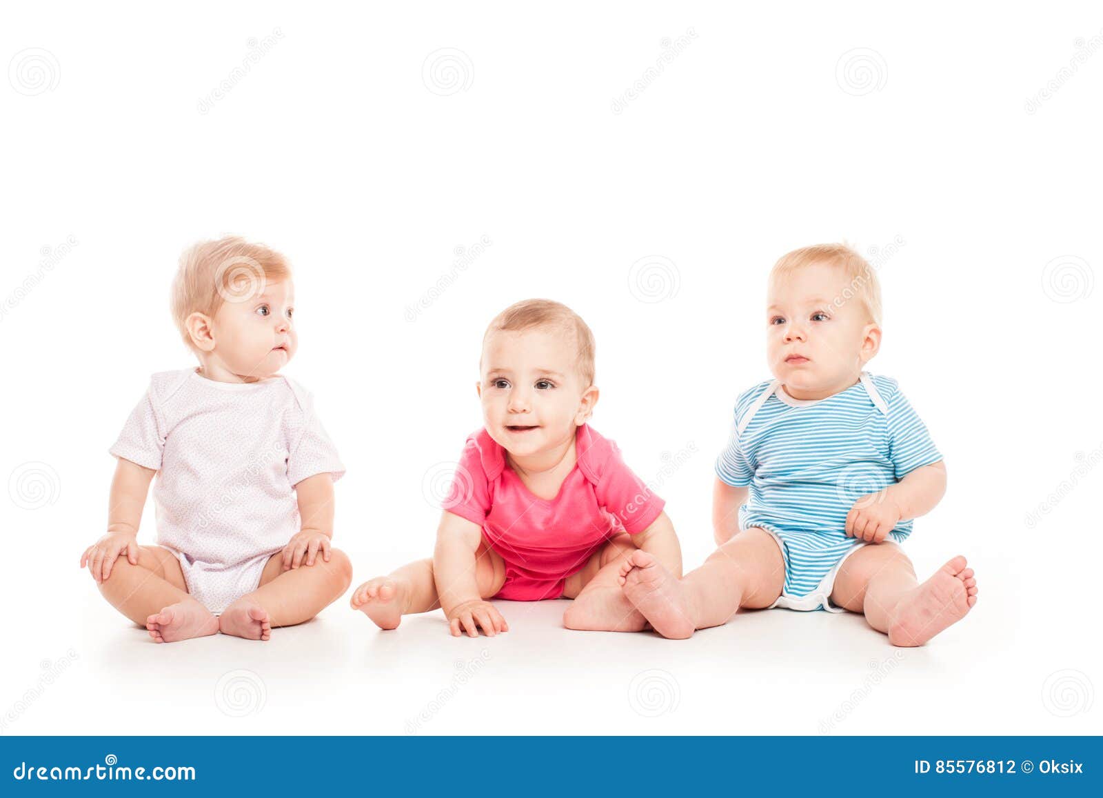 Three babies sitting stock photo. Image of cute, leisure - 85576812
