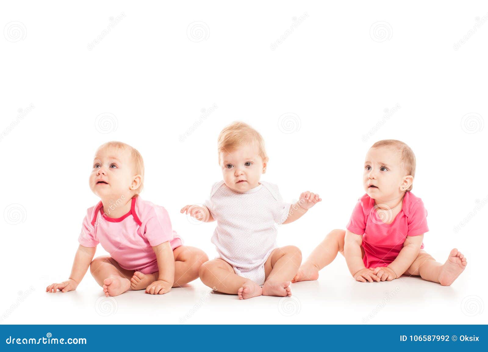 Three babies sitting stock photo. Image of childhood - 106587992
