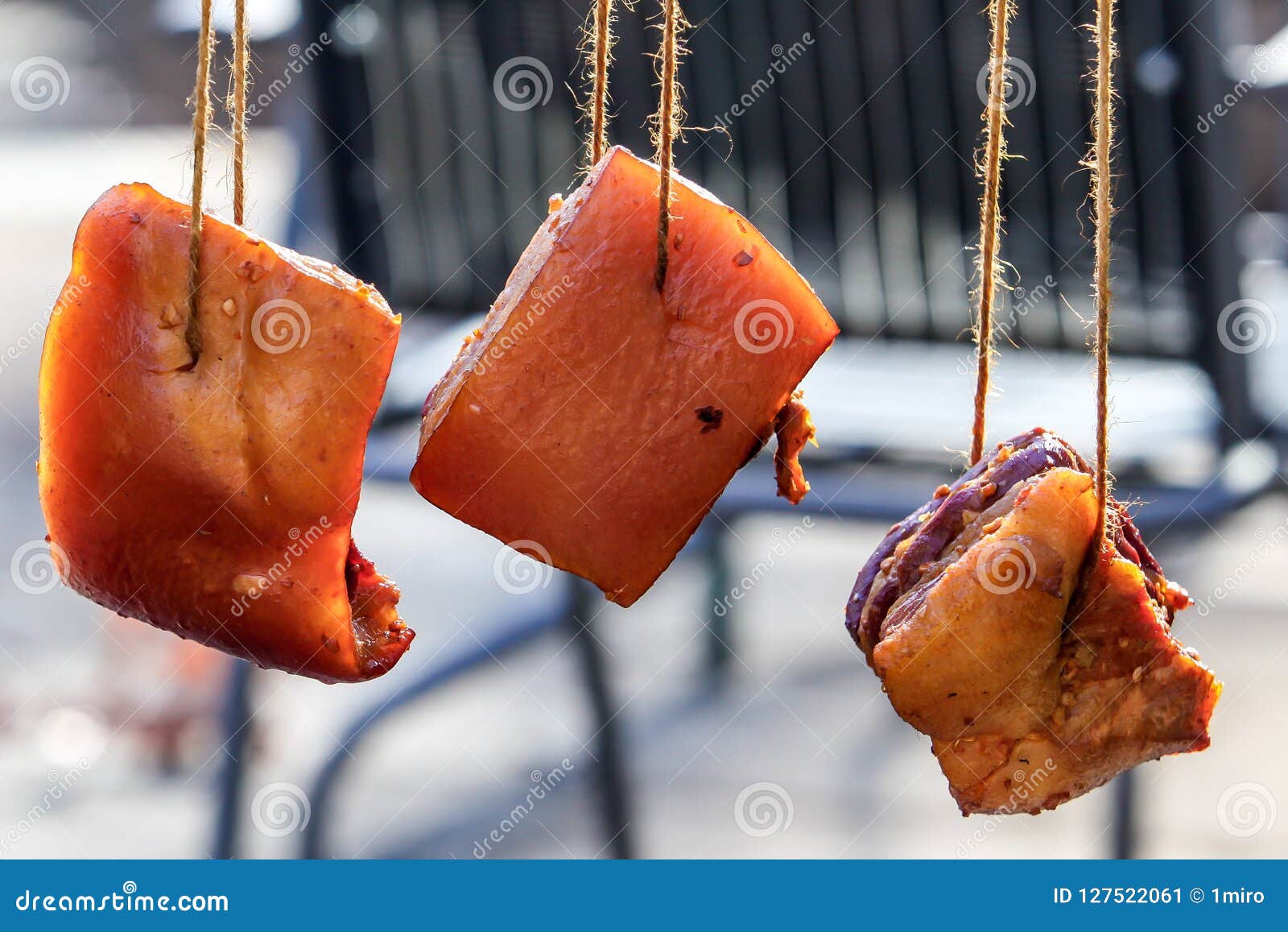 Three Bacon Hanging Outside Stock Image - Image of delicious, tasty ...