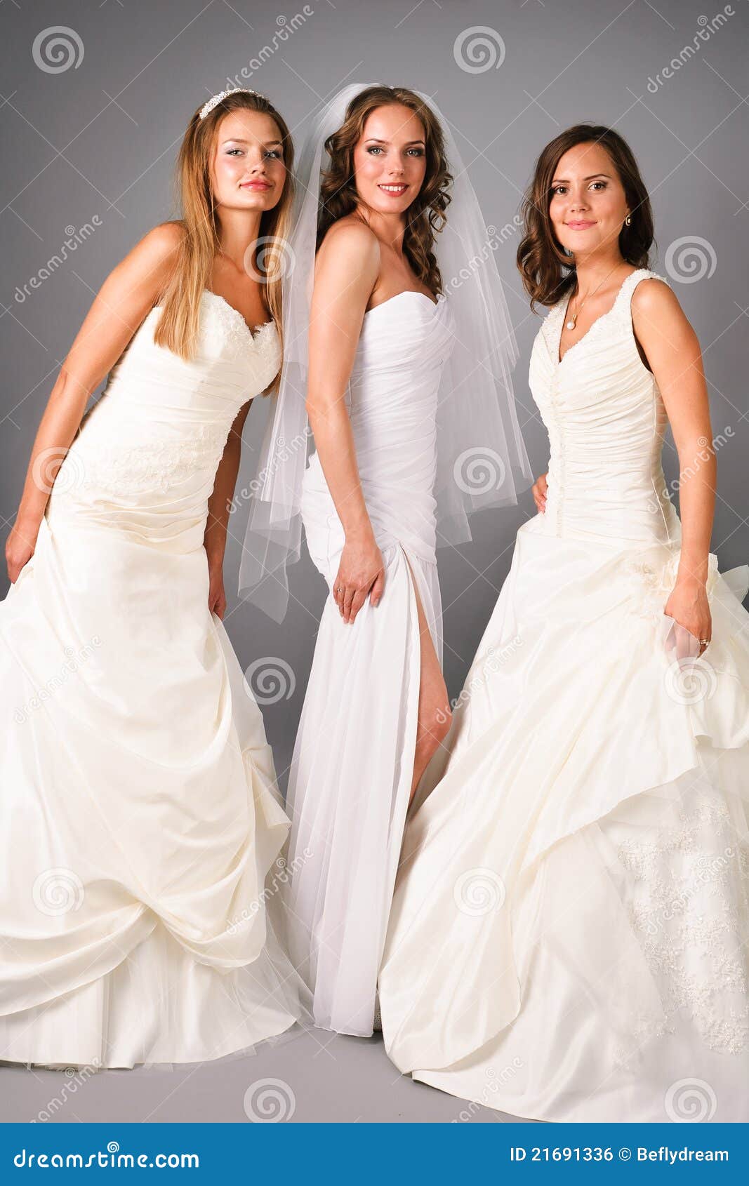 Three Beautiful Brides Posing in Studio Stock Photo - Image of hairdo ...