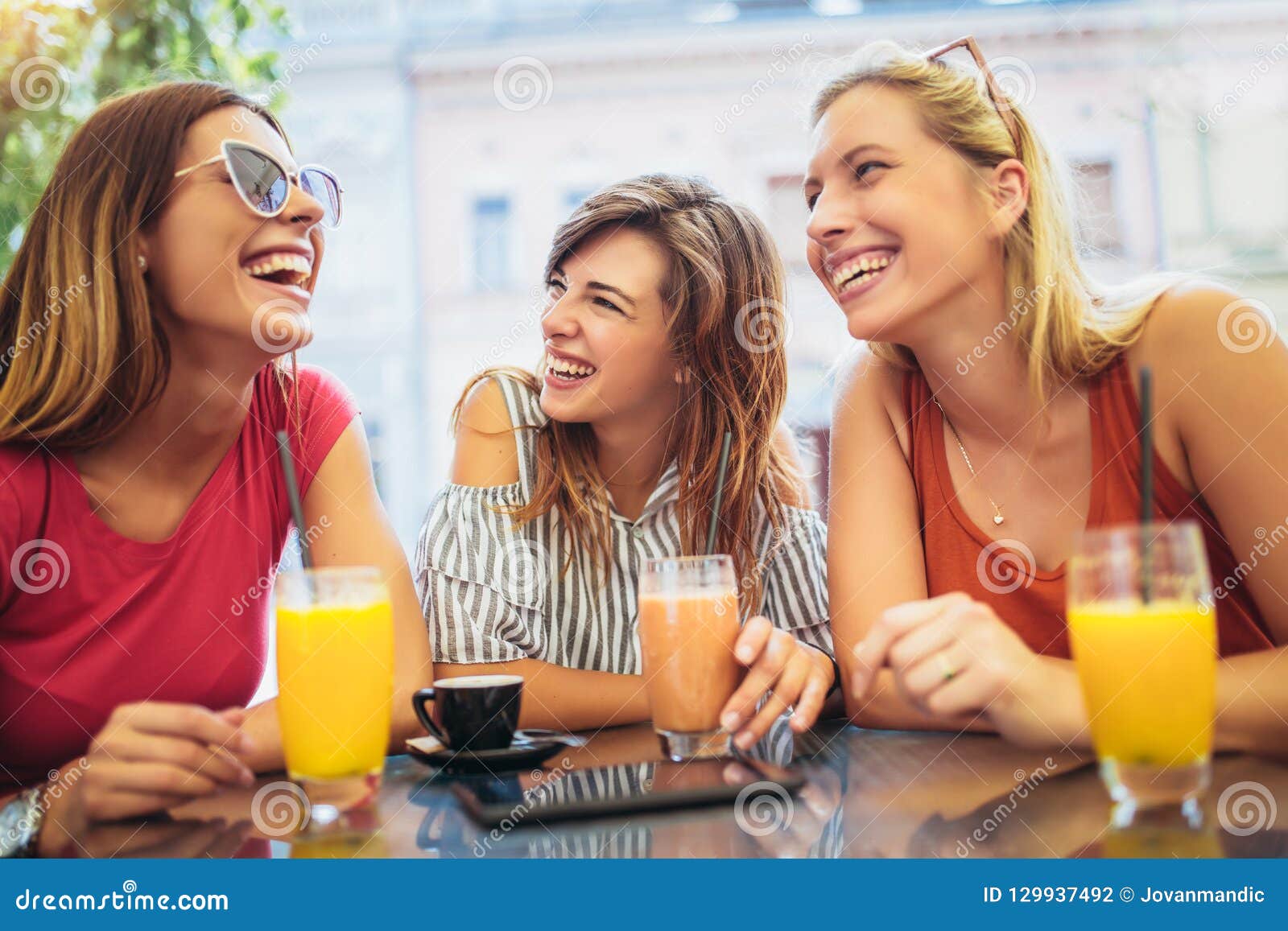 Beautiful Friends in a Cafe Having Fun Stock Photo - Image of casual ...