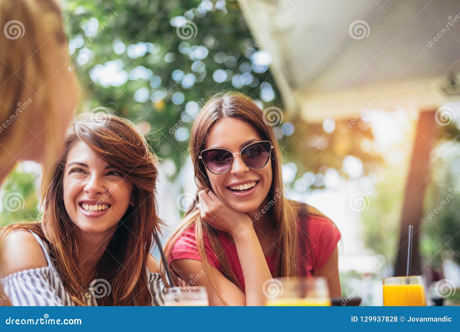 Beautiful Friends in a Cafe Having Fun Stock Photo - Image of cute ...