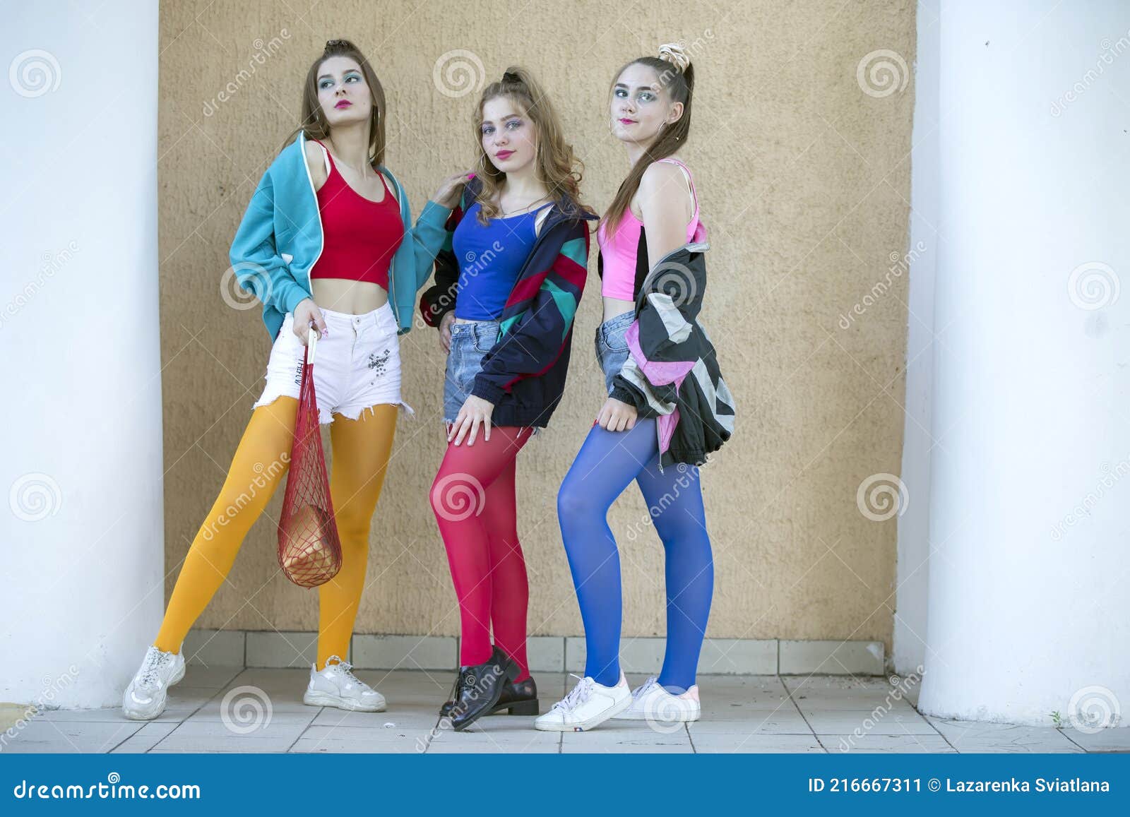 Three Beautiful Girls Dressed in the Style of the Nineties Stock Image ...