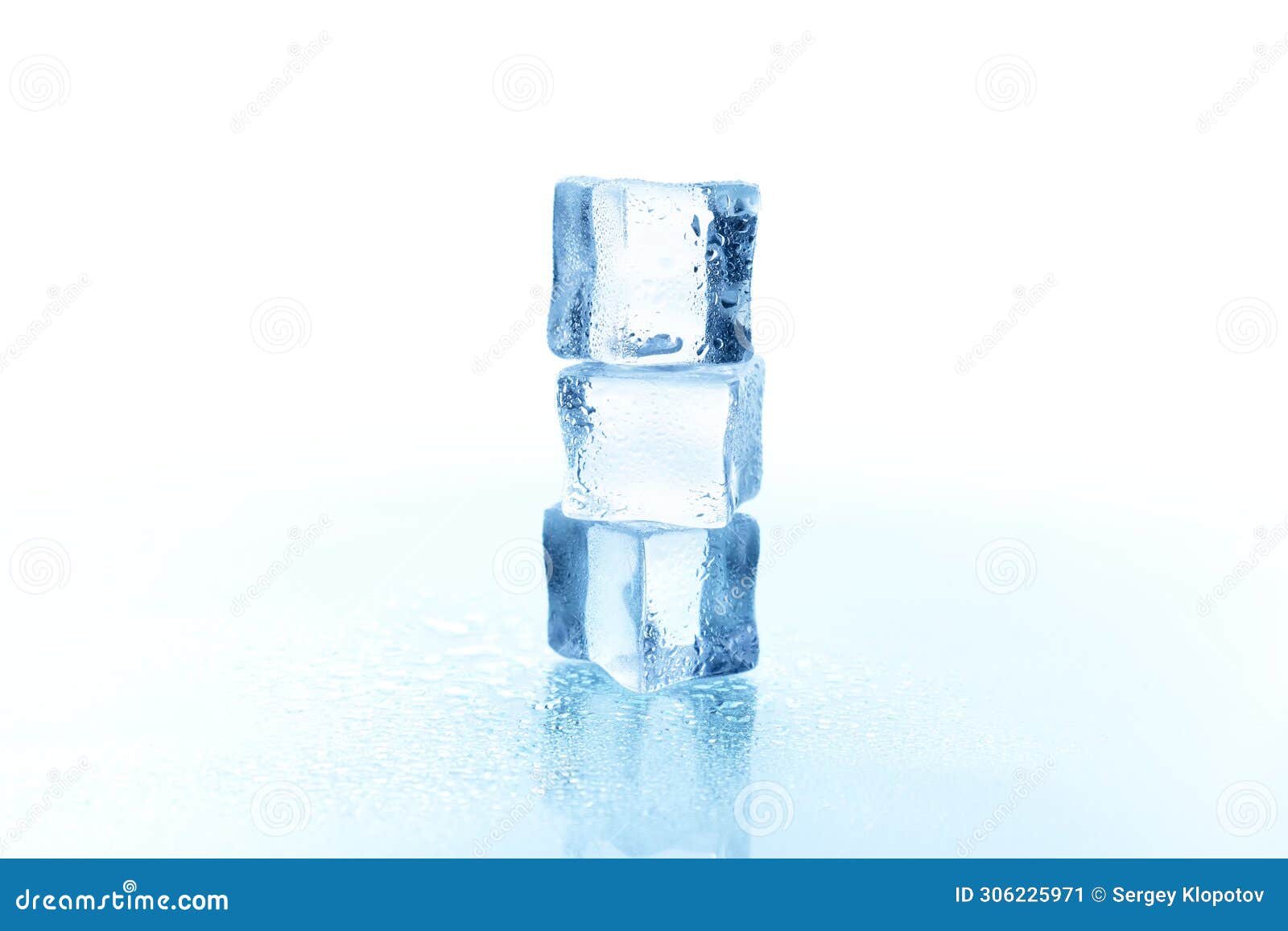 Three Beautiful Large Pieces of Ice with Drops of Water on a Light ...