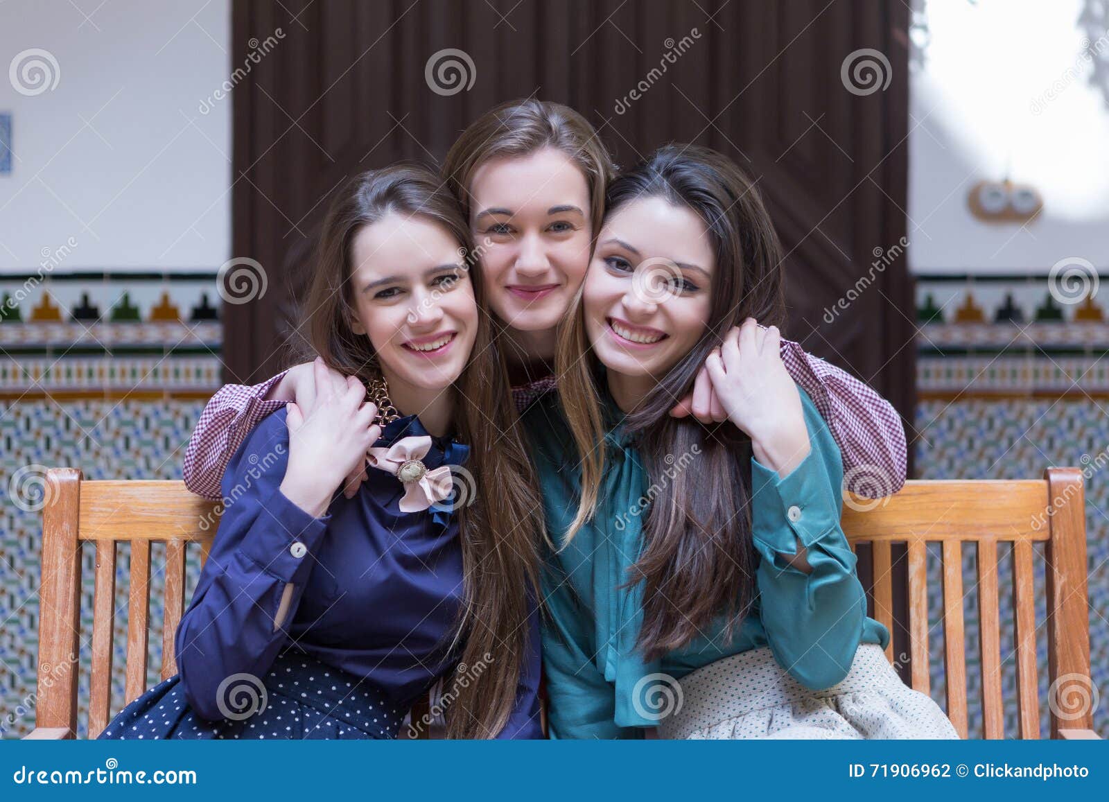 Three Beautiful Women Hugging on Bench Stock Photo - Image of women ...