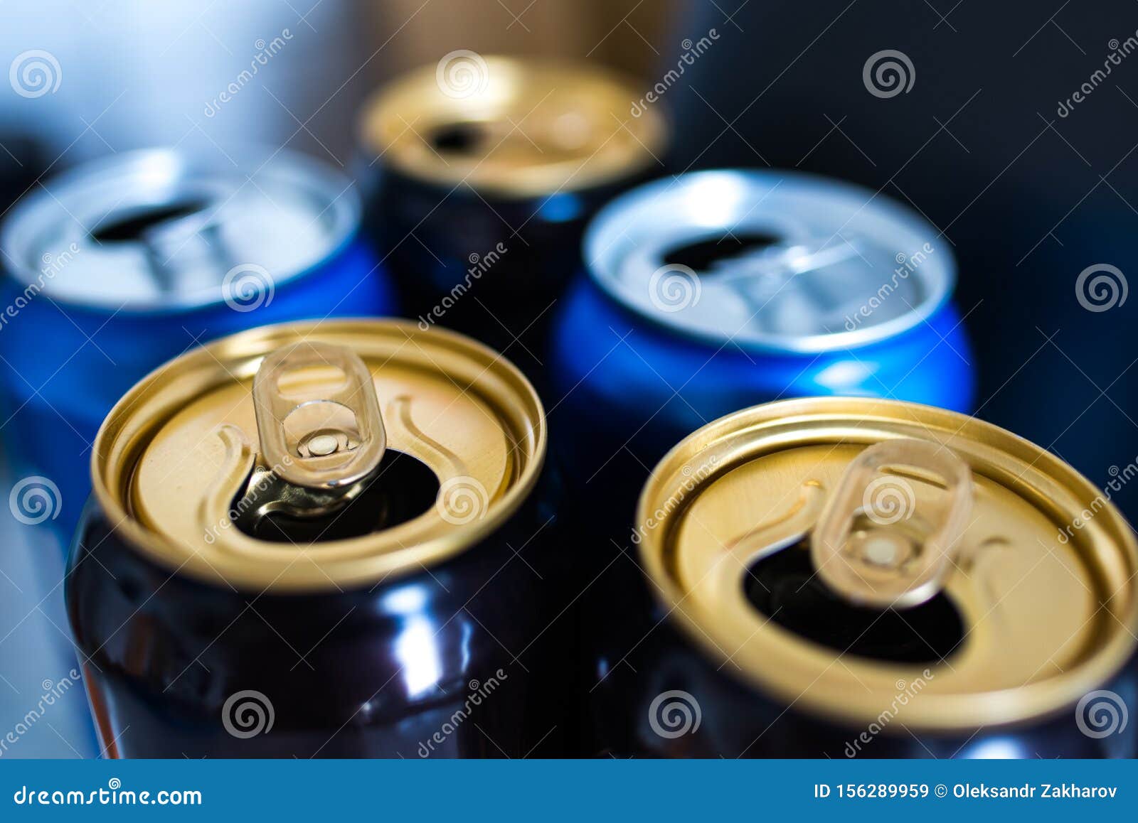 Three Beer Cans on an Abstract Background Stock Image - Image of ...