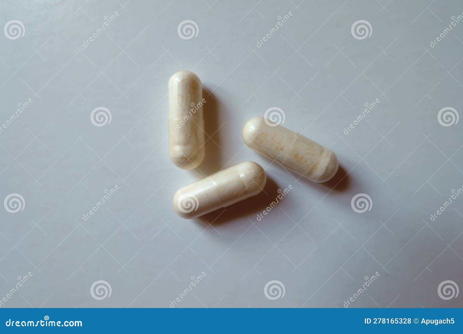 Three Beige Capsules of Probiotic Dietary Supplement from Above Stock ...