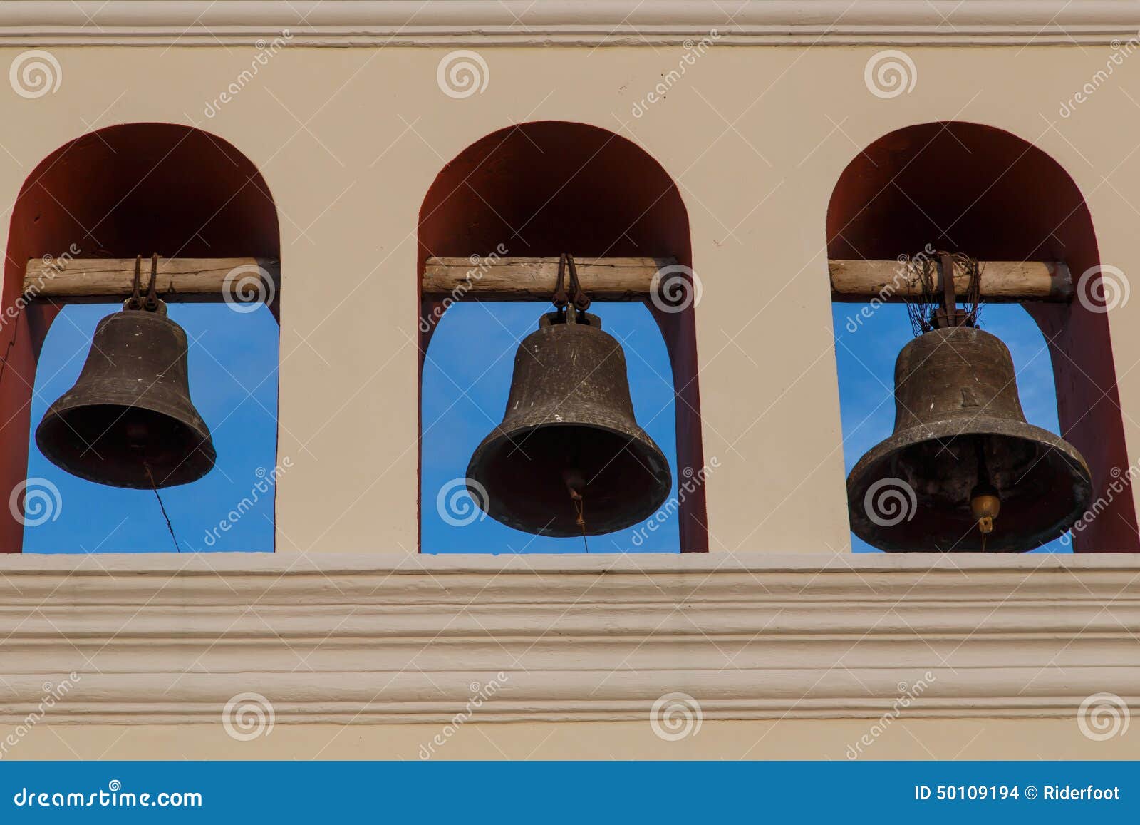 Three bells from a church stock photo. Image of blue - 50109194
