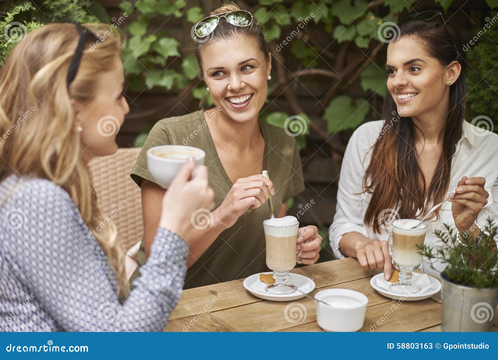 Three best friends at cafe stock image. Image of naturalness - 58803163