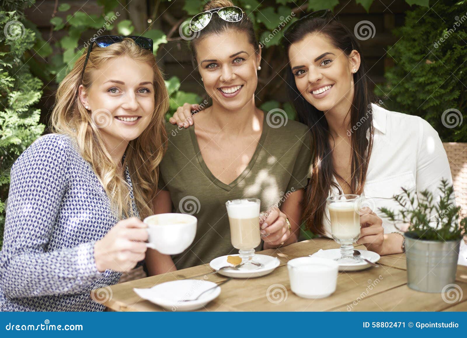 Three best friends at cafe stock image. Image of friends - 58802471