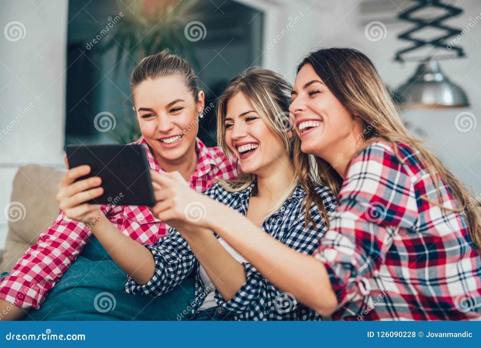Three Best Friends Using Digital Tablet Together. Stock Photo - Image ... Three Best Friends Using Digital Tablet Together. Stock Photo - Image ...