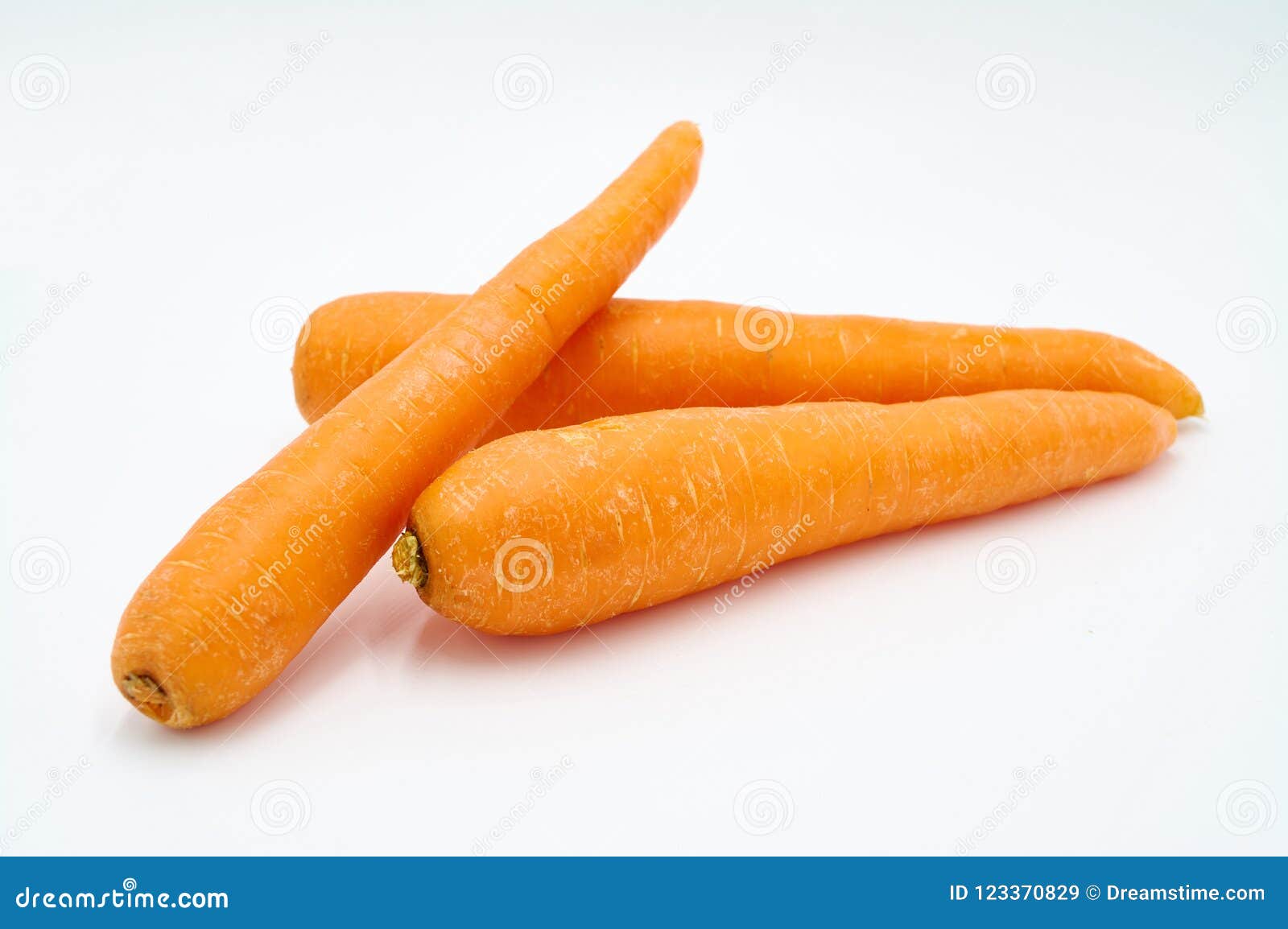 Three big and long Carrots stock image. Image of food - 123370829