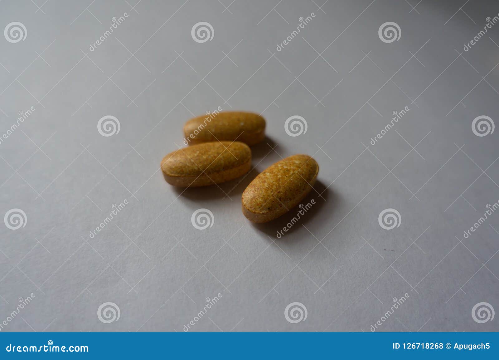 Three Big Tablets of Multivitamins Supplement Stock Photo - Image of ...