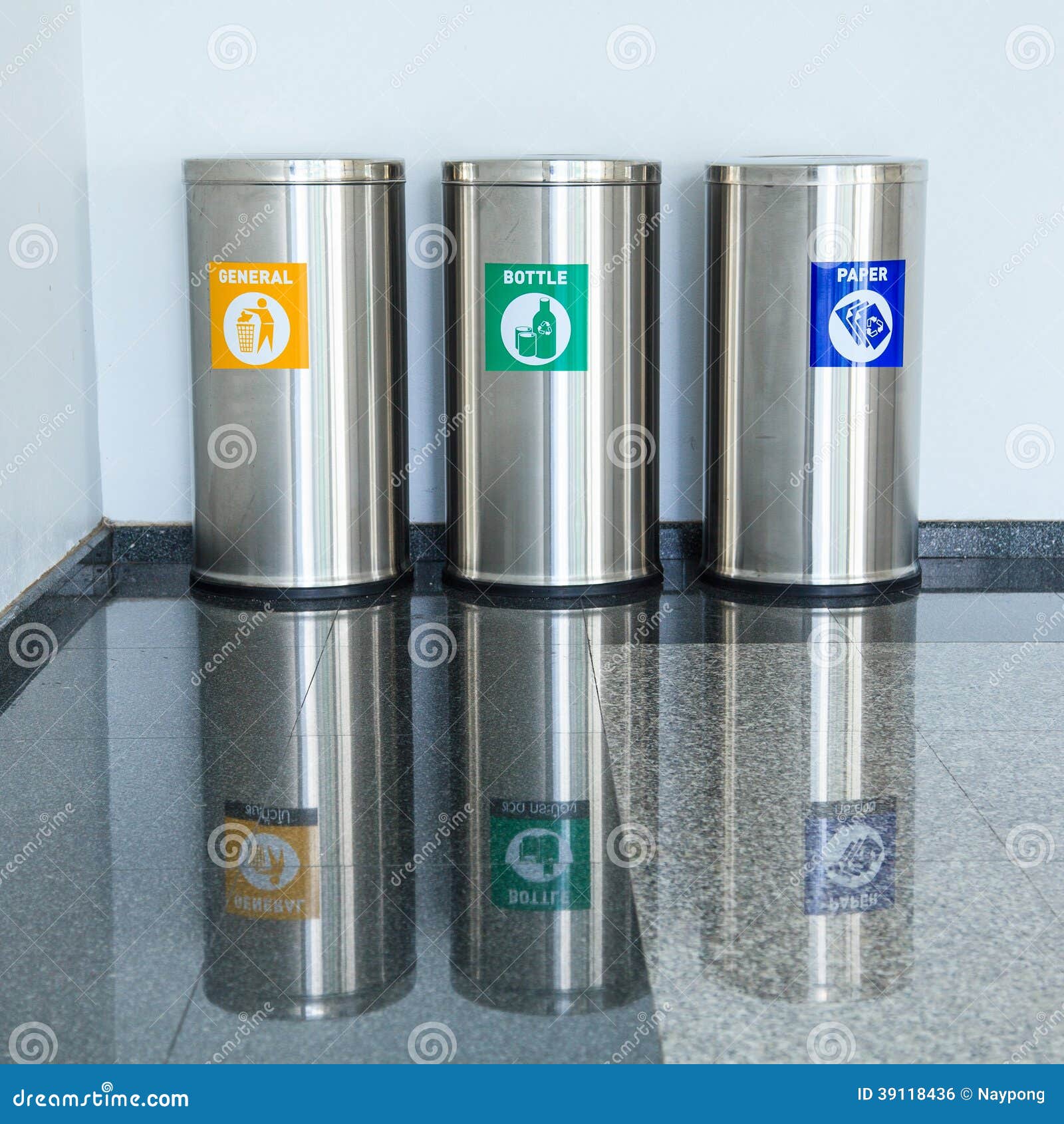 Three Bins Full Of Garbage And Overflowing Outside. Stock Photo ...