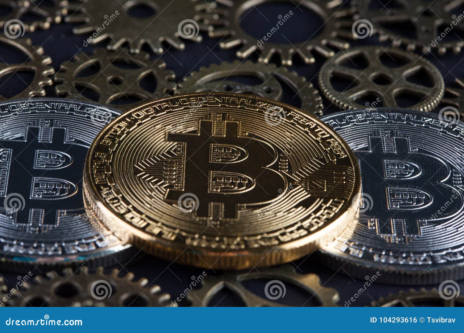 Three Bitcoins among Various Cog Wheels Extreme Closeup on Blurred ...