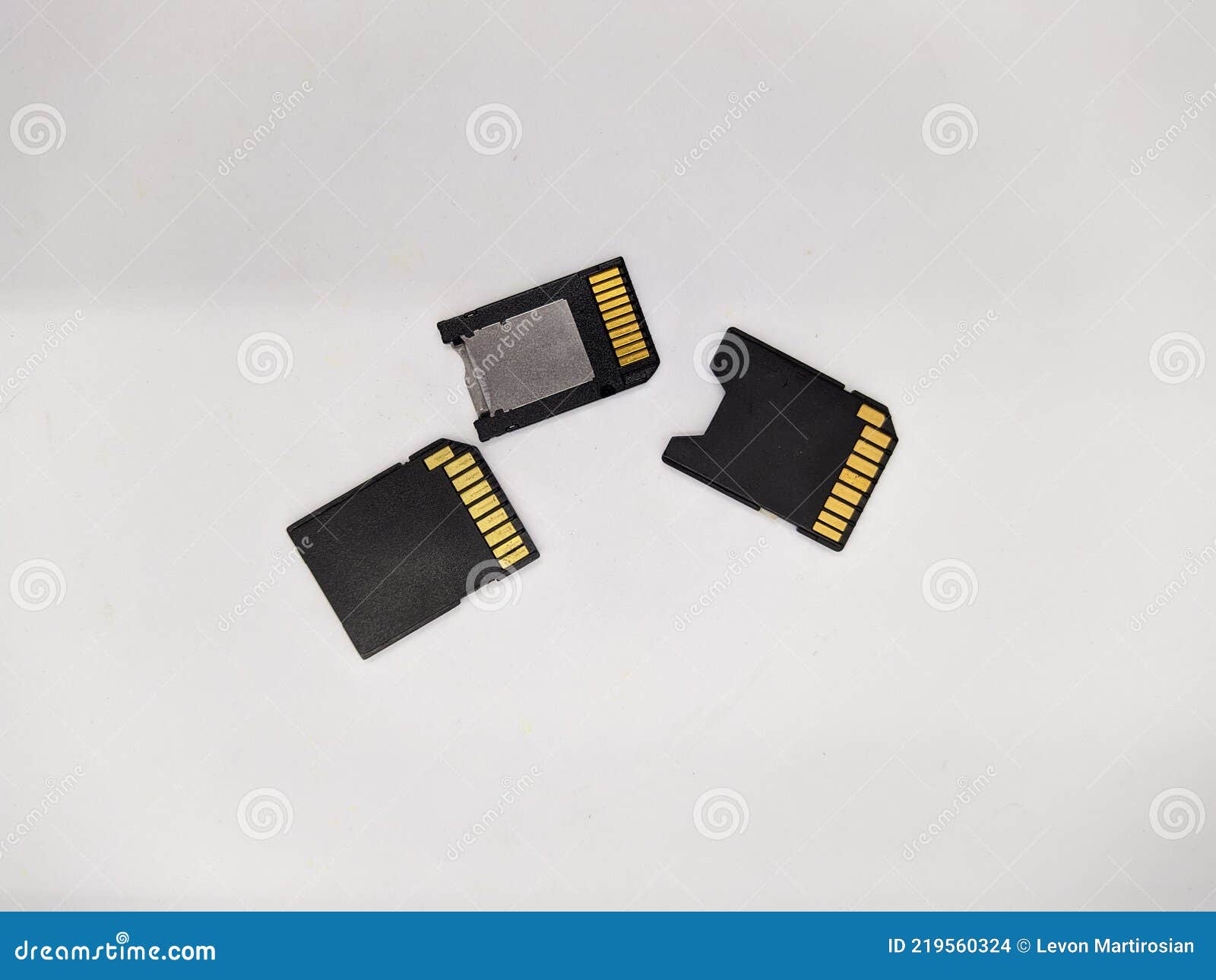 Three Black Memory Card Adapters on a White Background Top View Stock ...