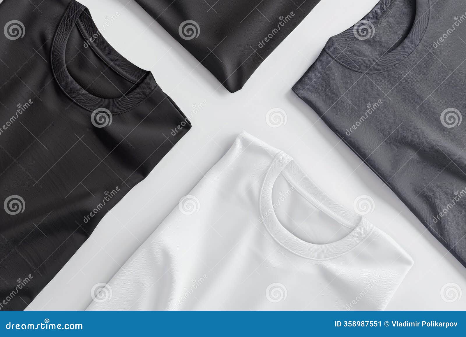 Three Black and White T-shirts Laid Out on a White Surface Stock Image ...