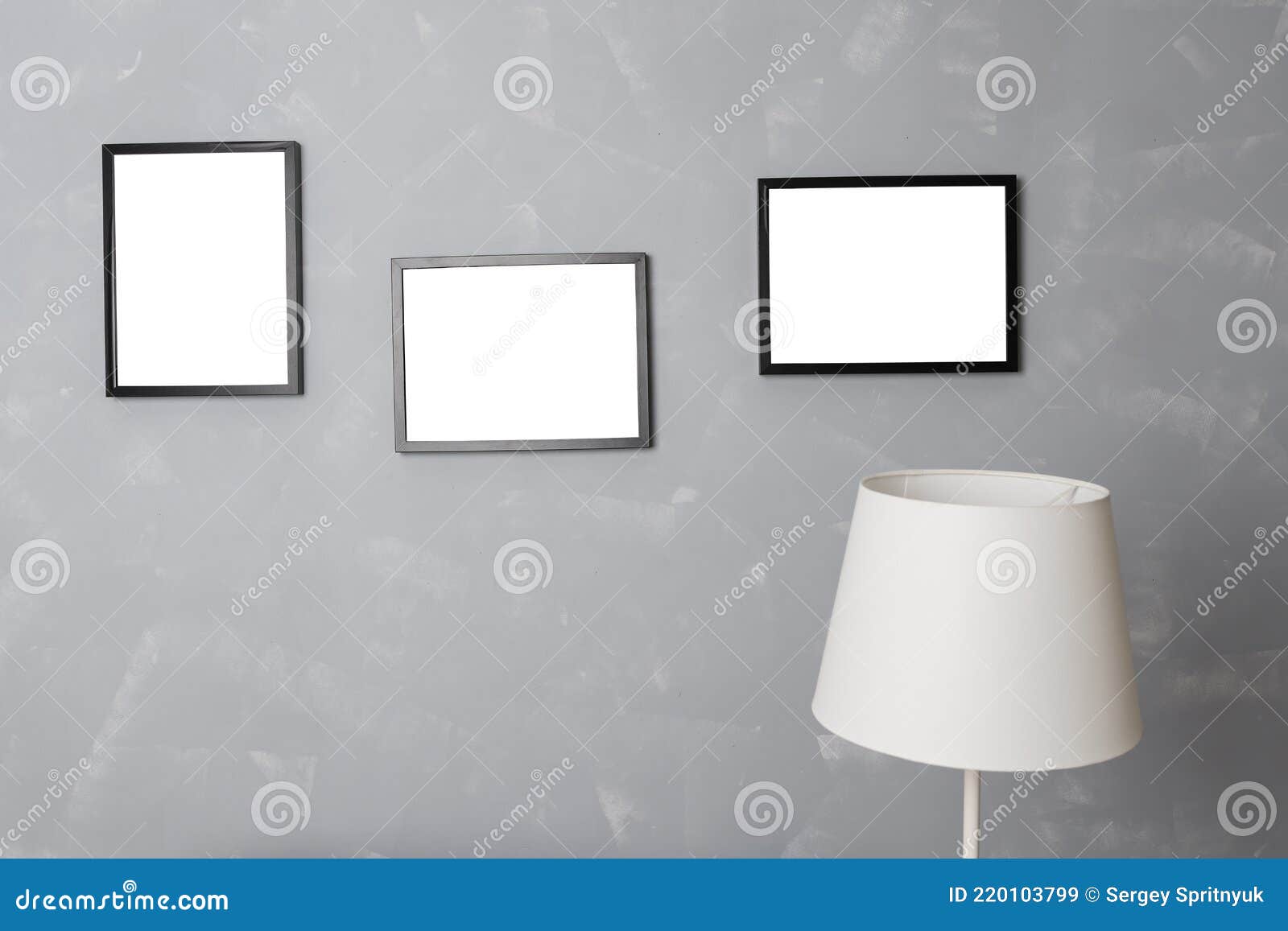 Three Blank Black Photo Frames on a Gray Wall in the Interior Stock ...