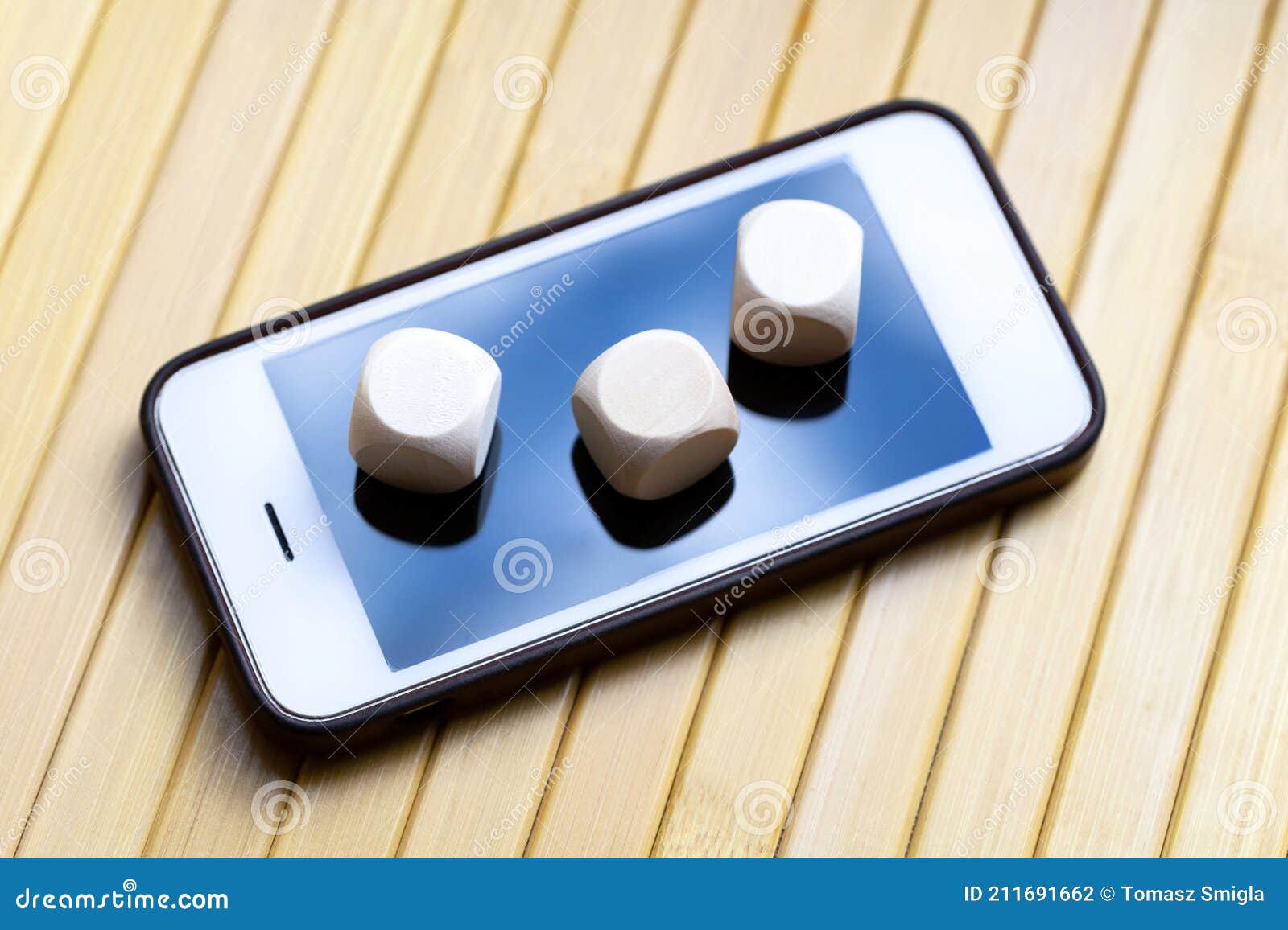 Three Blank Empty Wooden Cubes Laying on Top of a Modern Smartphone ...