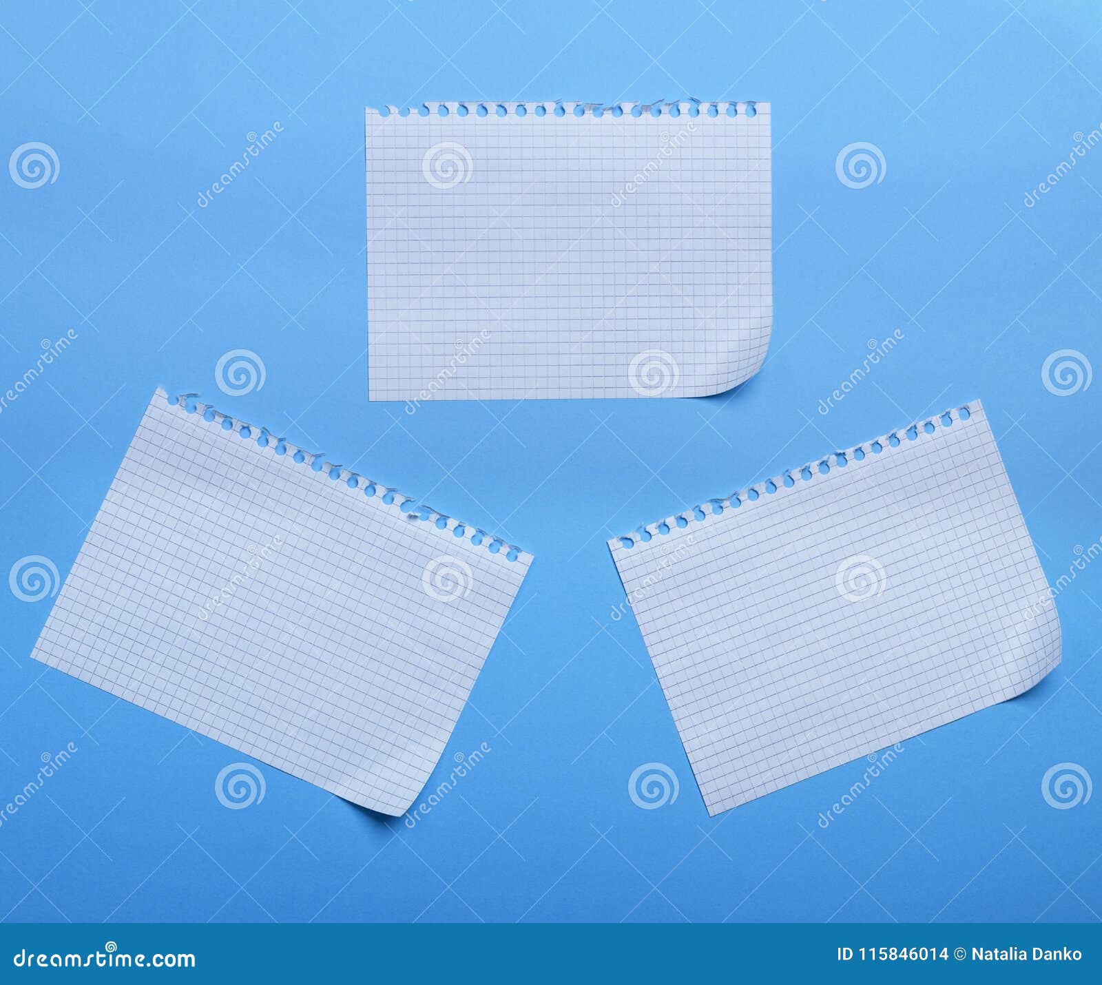 Three Blank Sheet of Paper with Curved Corners on a Blue Background ...