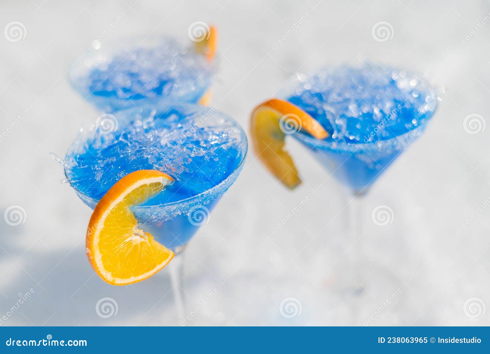 Three Blue Alcoholic Cocktails on the Snow. Stock Image - Image of ...