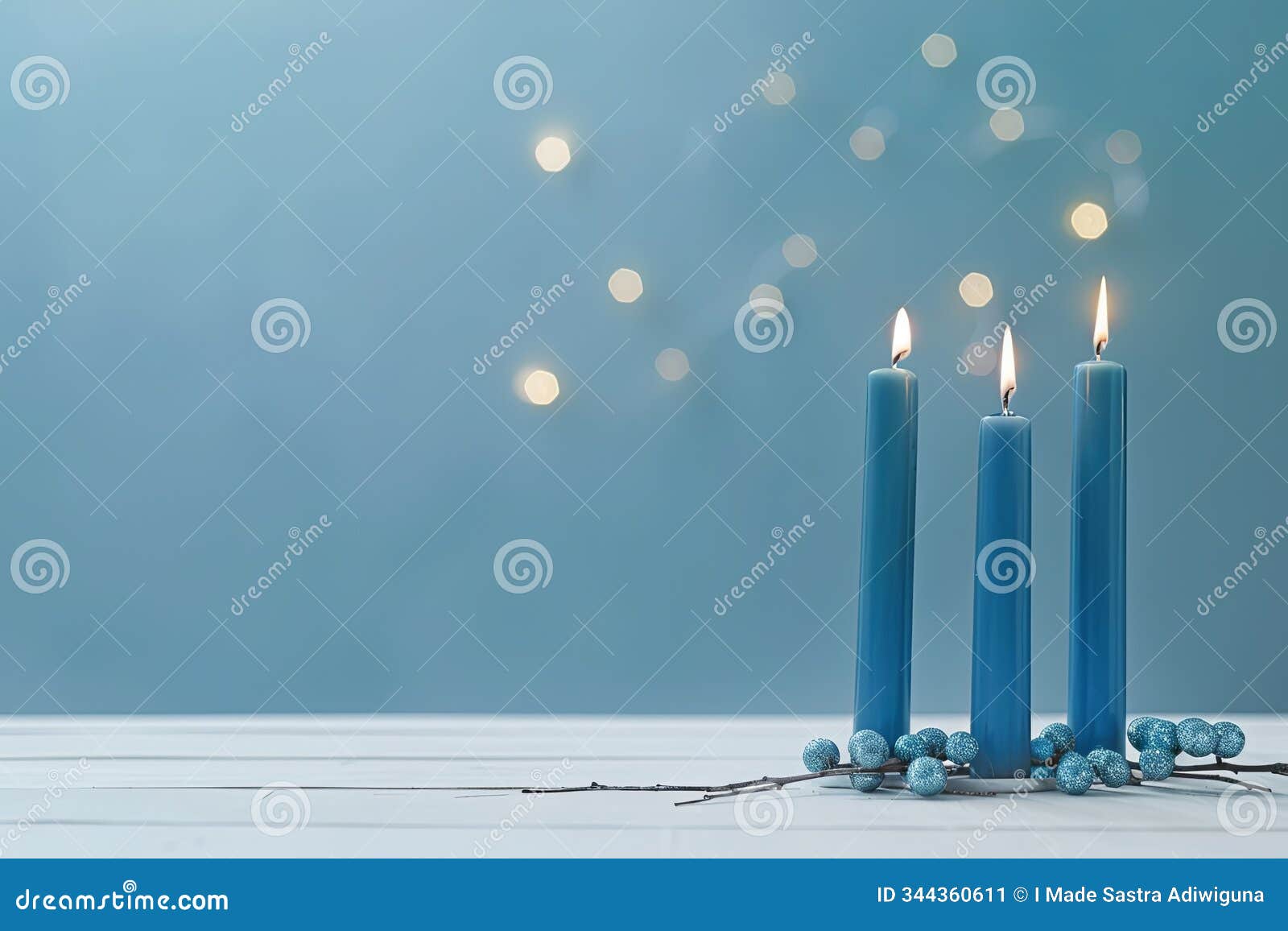 Three Blue Candles Burning Bright on a Table. Holiday, Celebration, or ...