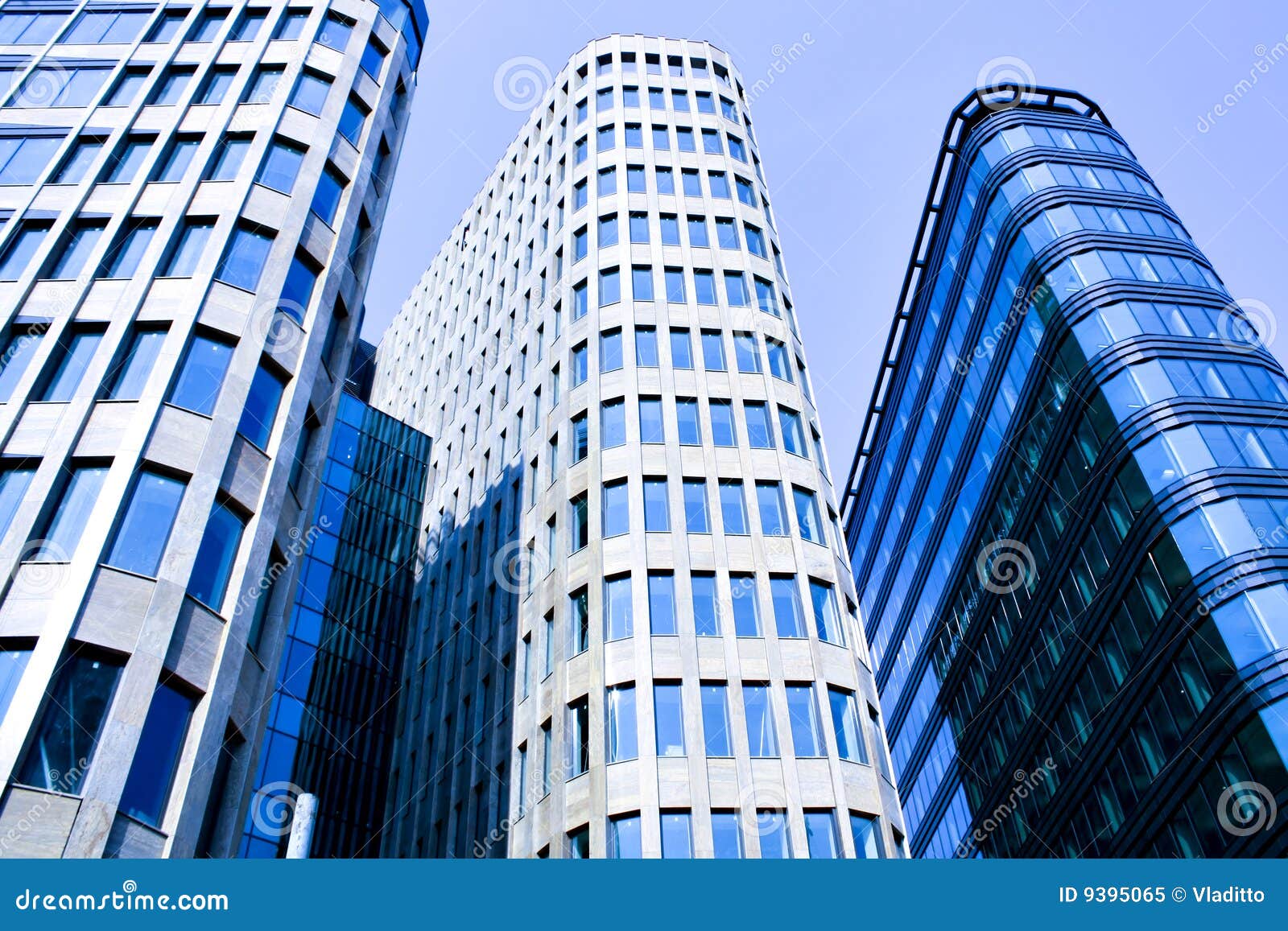 Three blue skyscrapers stock image. Image of moscow, mirror - 9395065