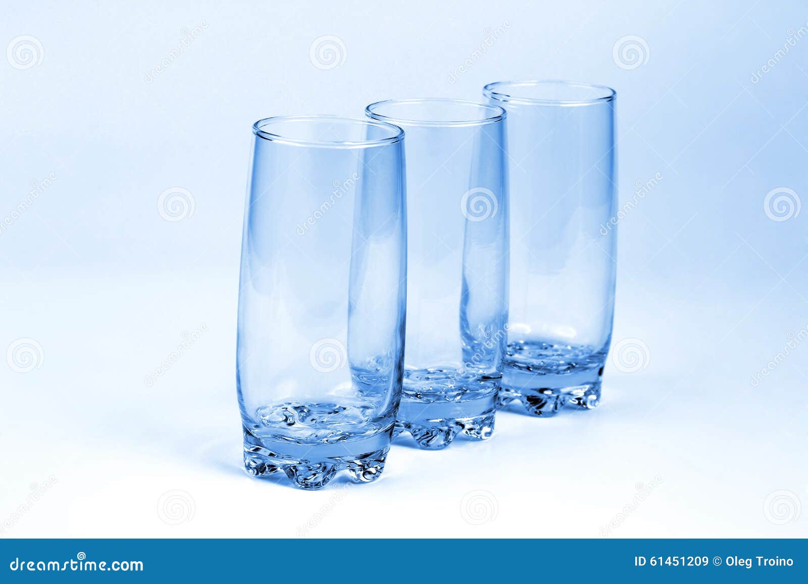 Three Blue Transparent Glass with a Light Blue Background Stock Image ...