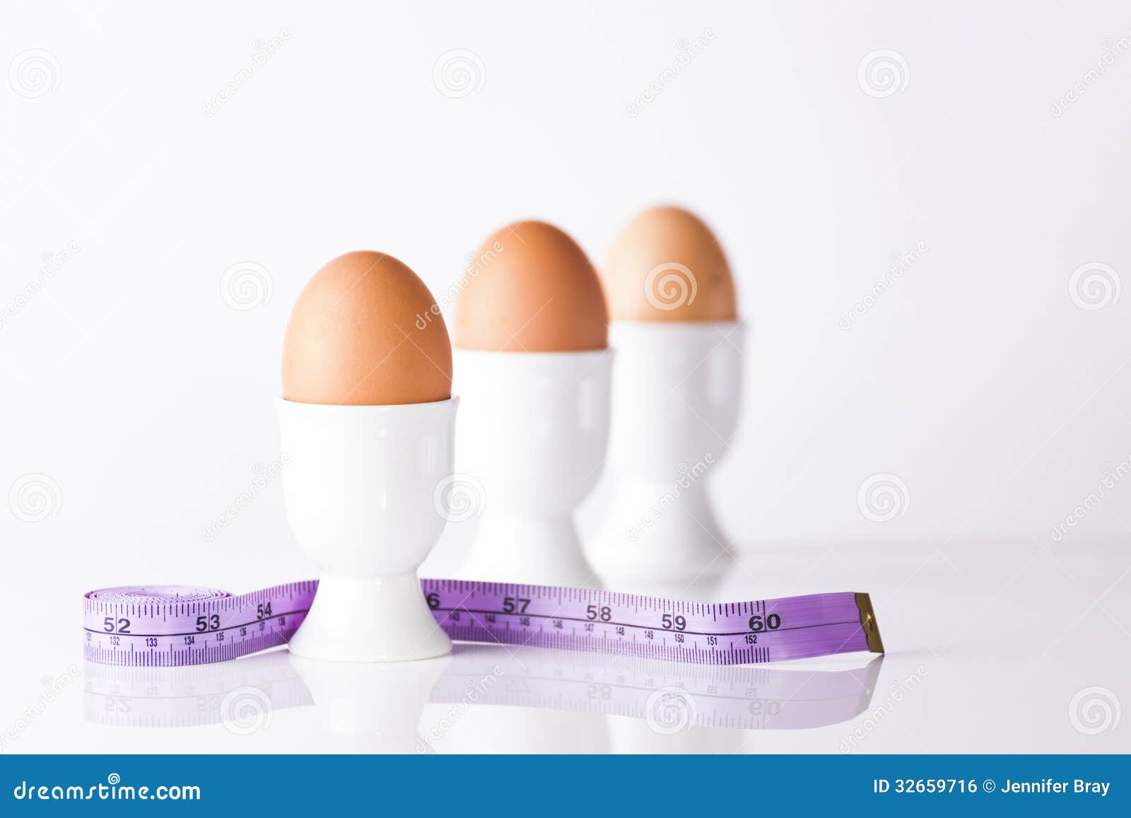 Three Boiled Eggs with Measuring Tape Stock Photo - Image of eggs ...