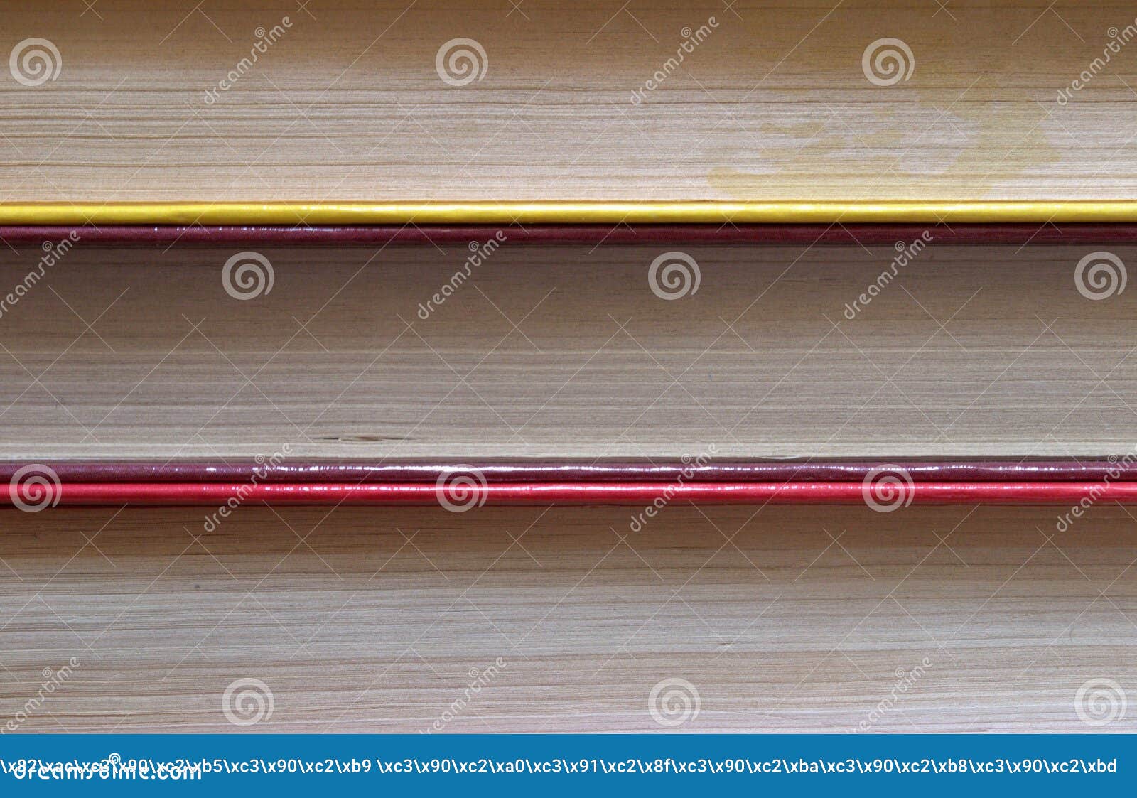 Three books in a stack stock photo. Image of floor, book - 223792332