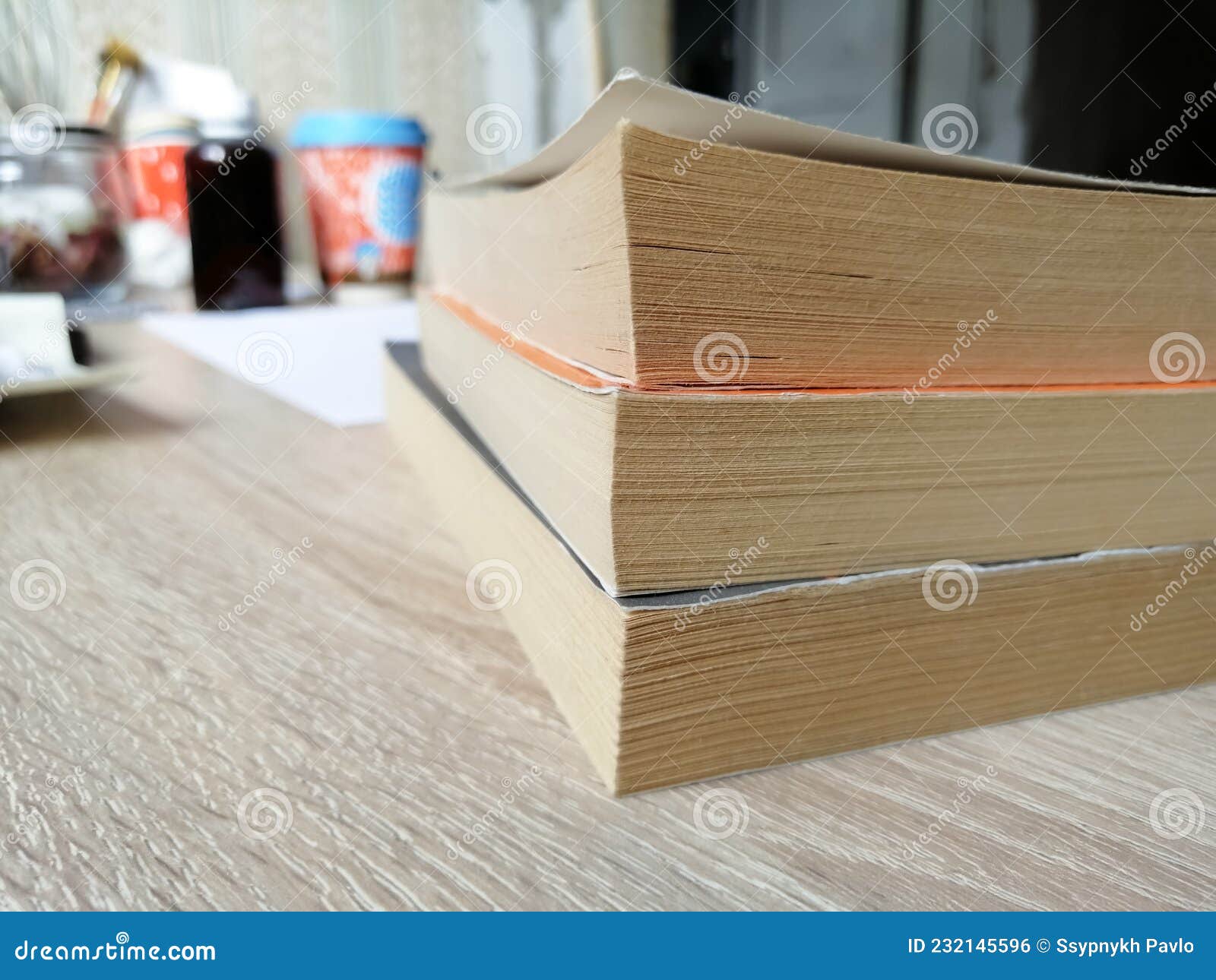 Three Books are Stacked on the Table. Stock Photo - Image of worn ...