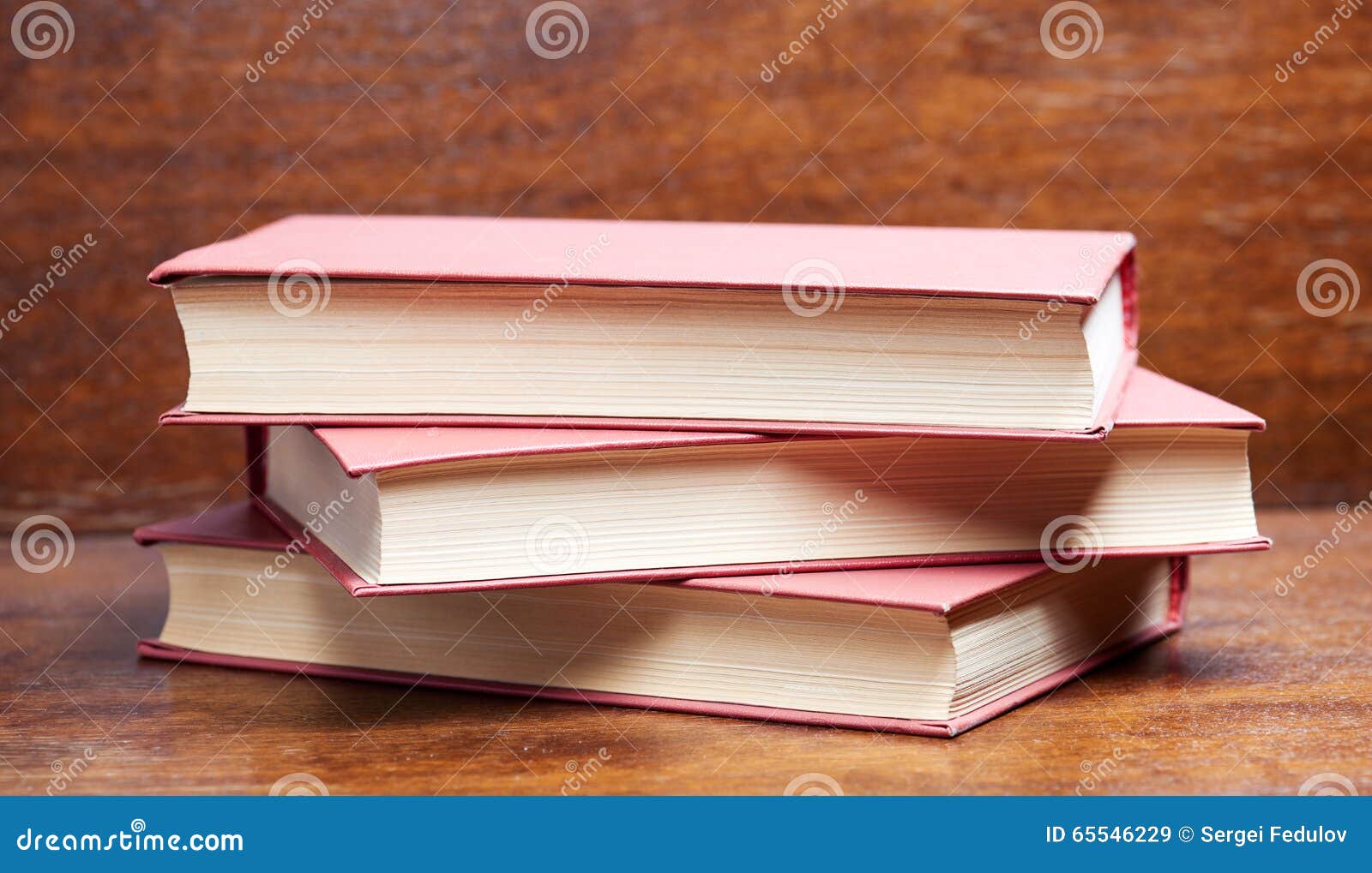 Three books on table stock image. Image of science, study - 65546229