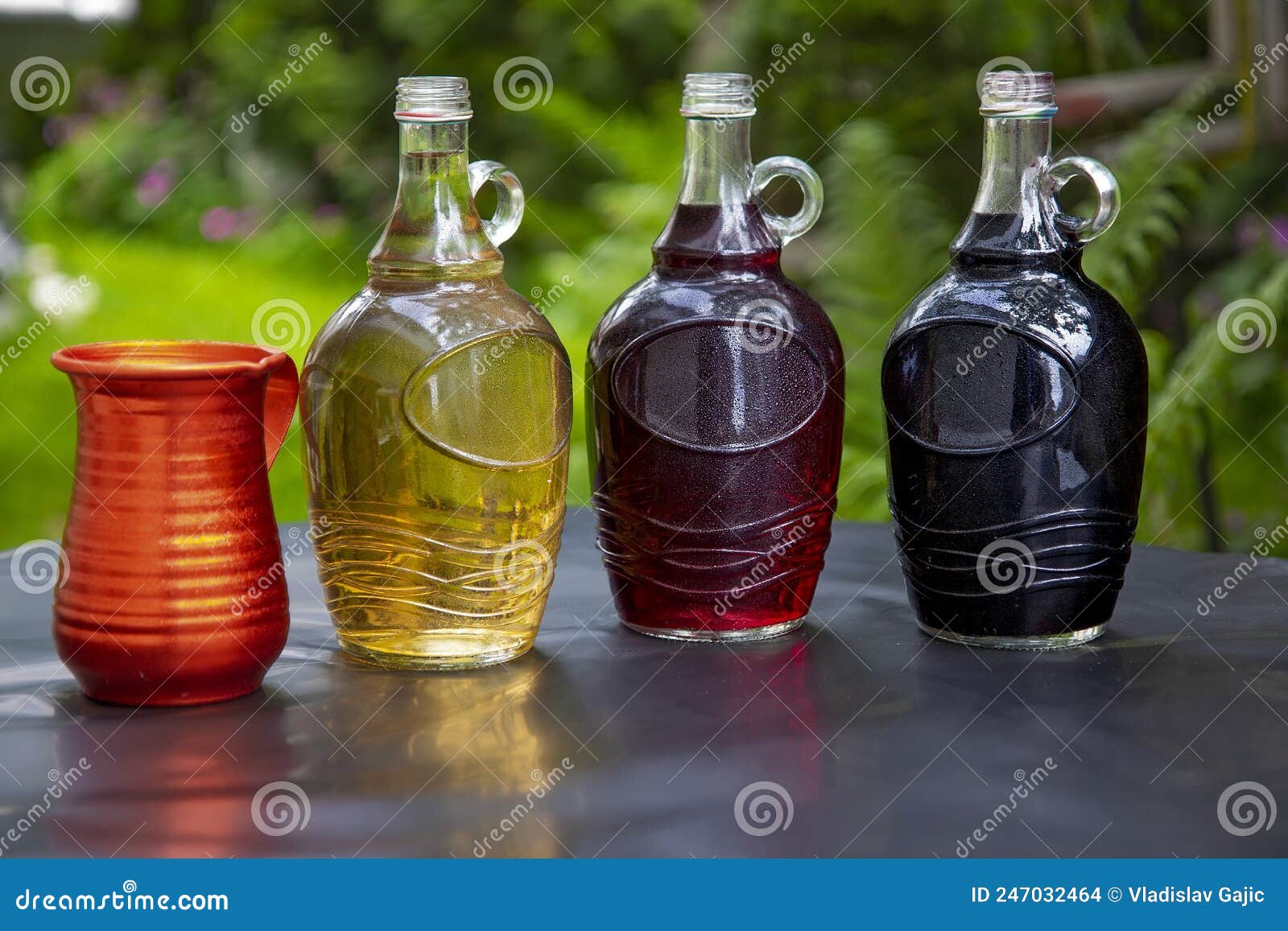 Bottles of Different Types of Wine on the Table Stock Photo - Image of ...