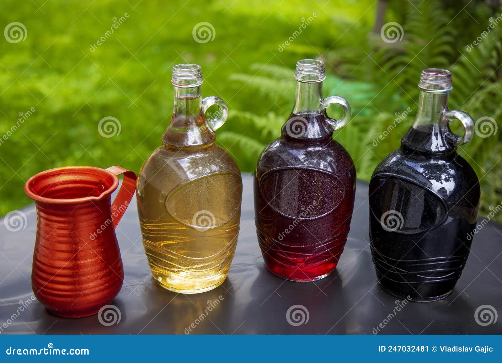 Types Of Wine In Bottles Hanging On The Wall Royalty-Free Stock ...