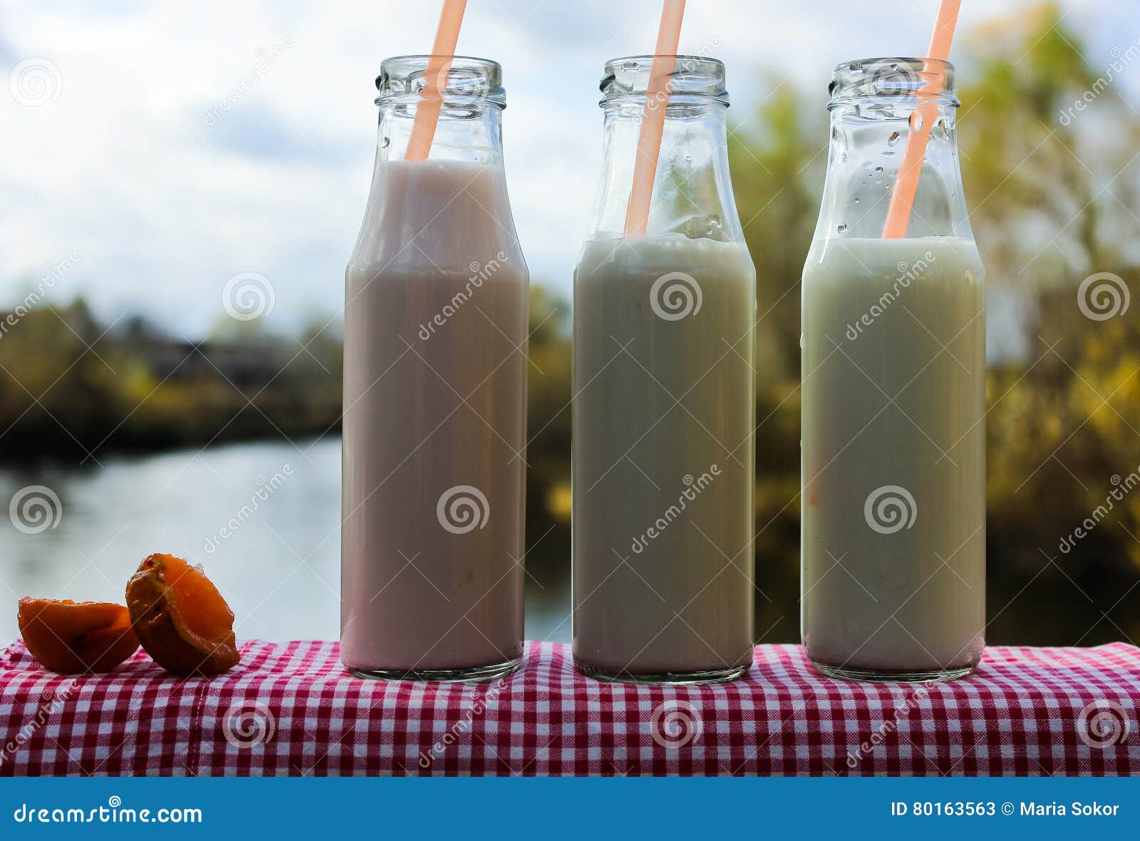 Three Bottles of Milk on the Table Stock Image - Image of glass, butter ...