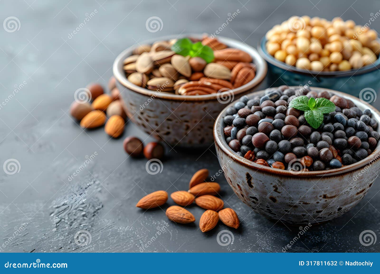 Three Bowls of Assorted Nuts and Beans, Natural Foods on Display Stock ...