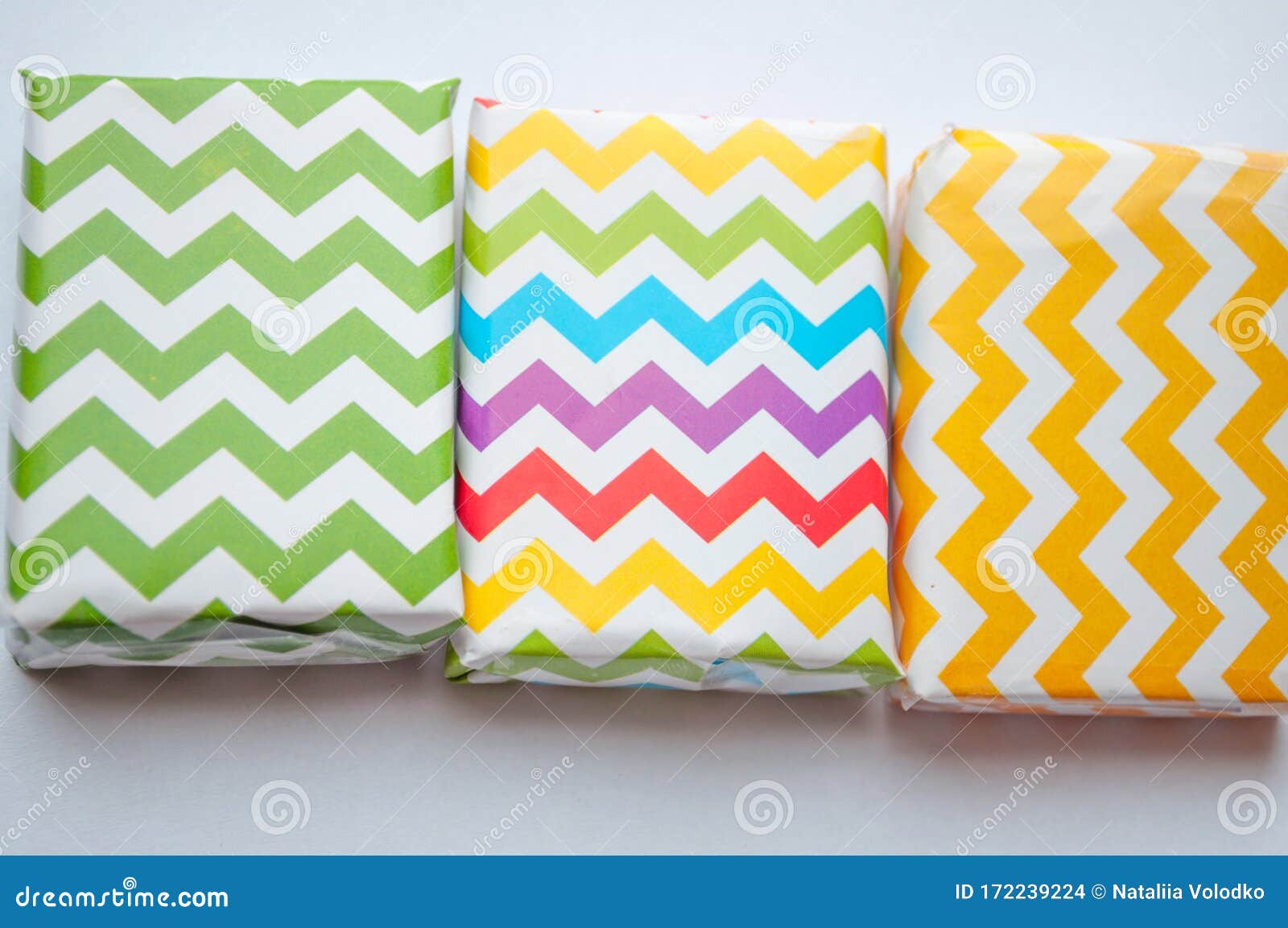 Three Boxes in the Style of a Multi-colored Wave Stock Photo - Image of ...