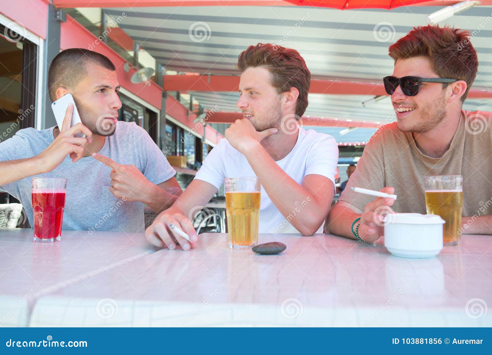 Three Boy Friends Having Drink Stock Photo - Image of order, lager ...