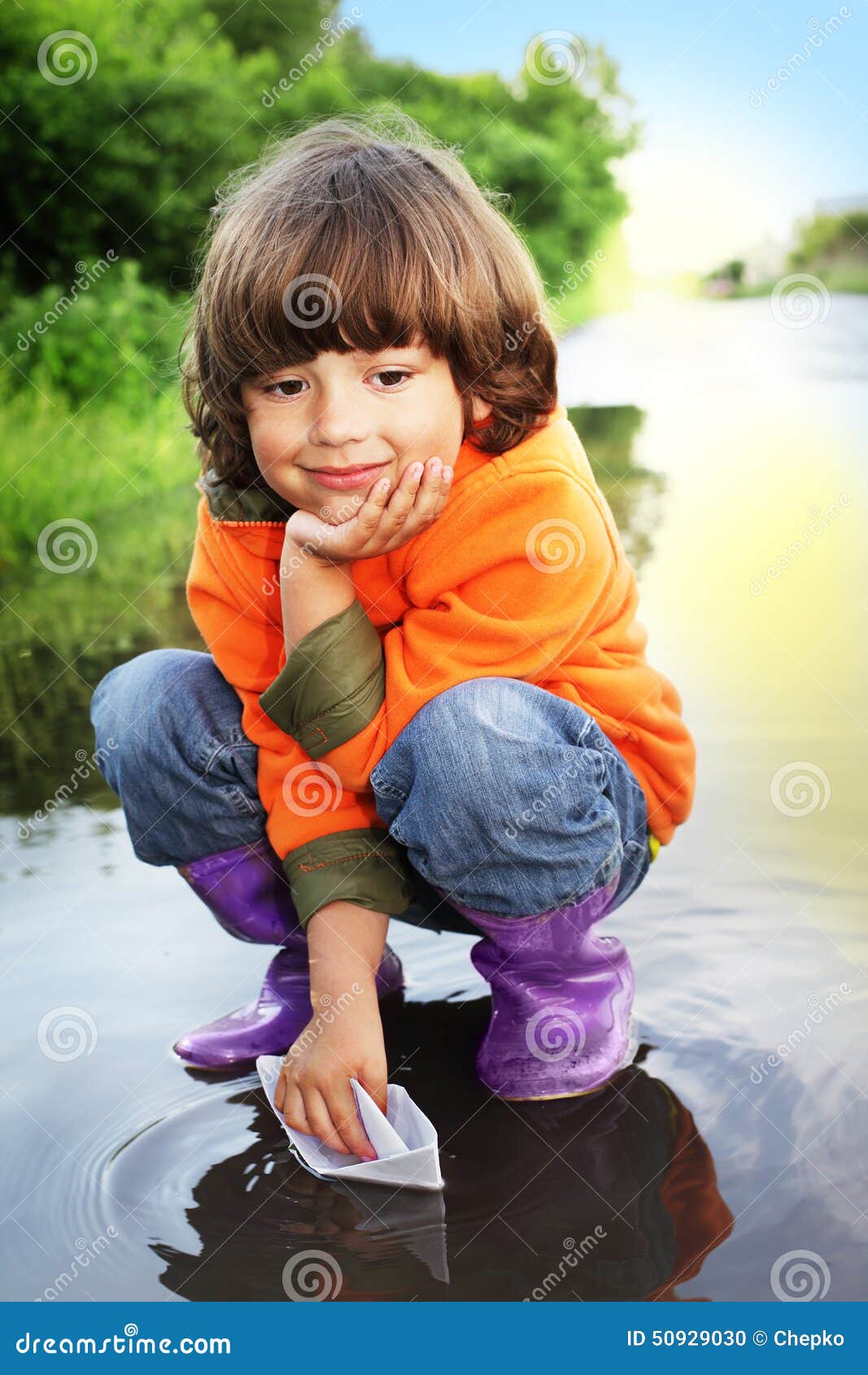 Three boy play in puddle stock photo. Image of pattern - 50929030