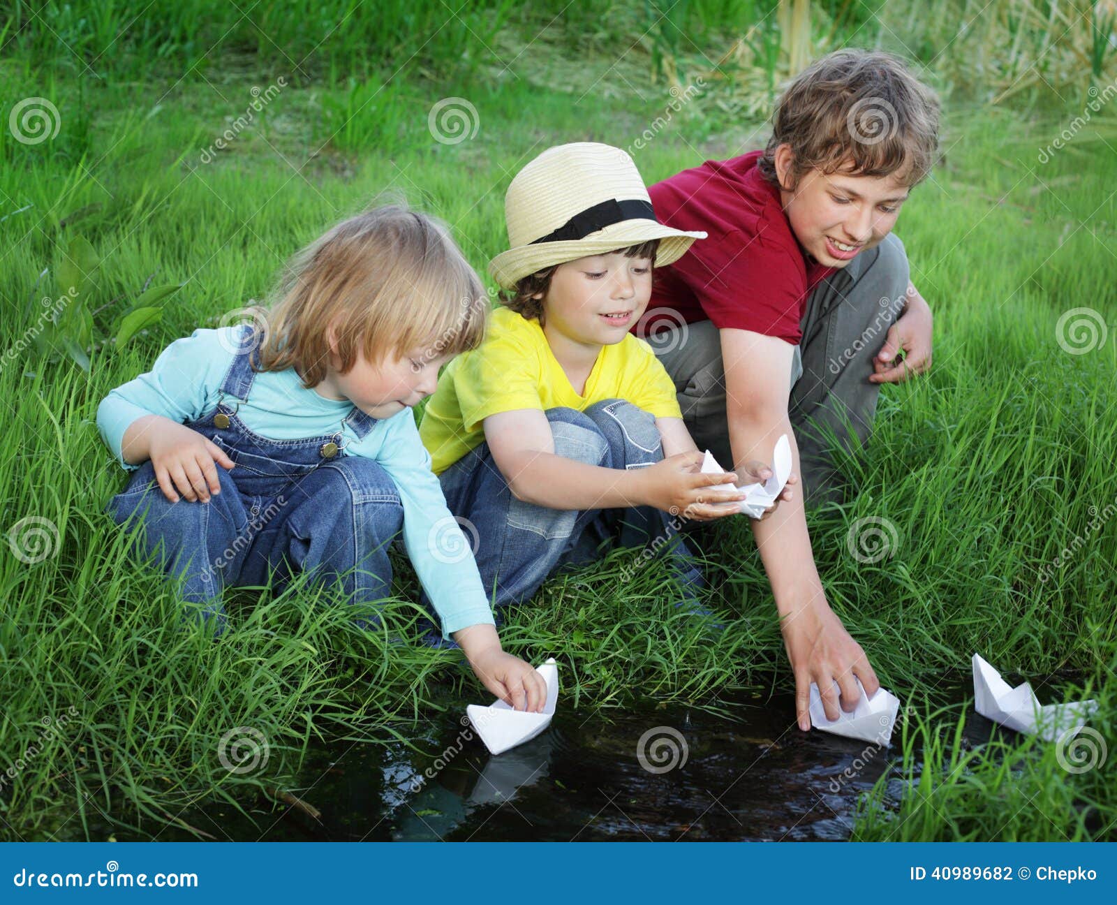 Three boy play in stream stock photo. Image of blue, lifestyles - 40989682