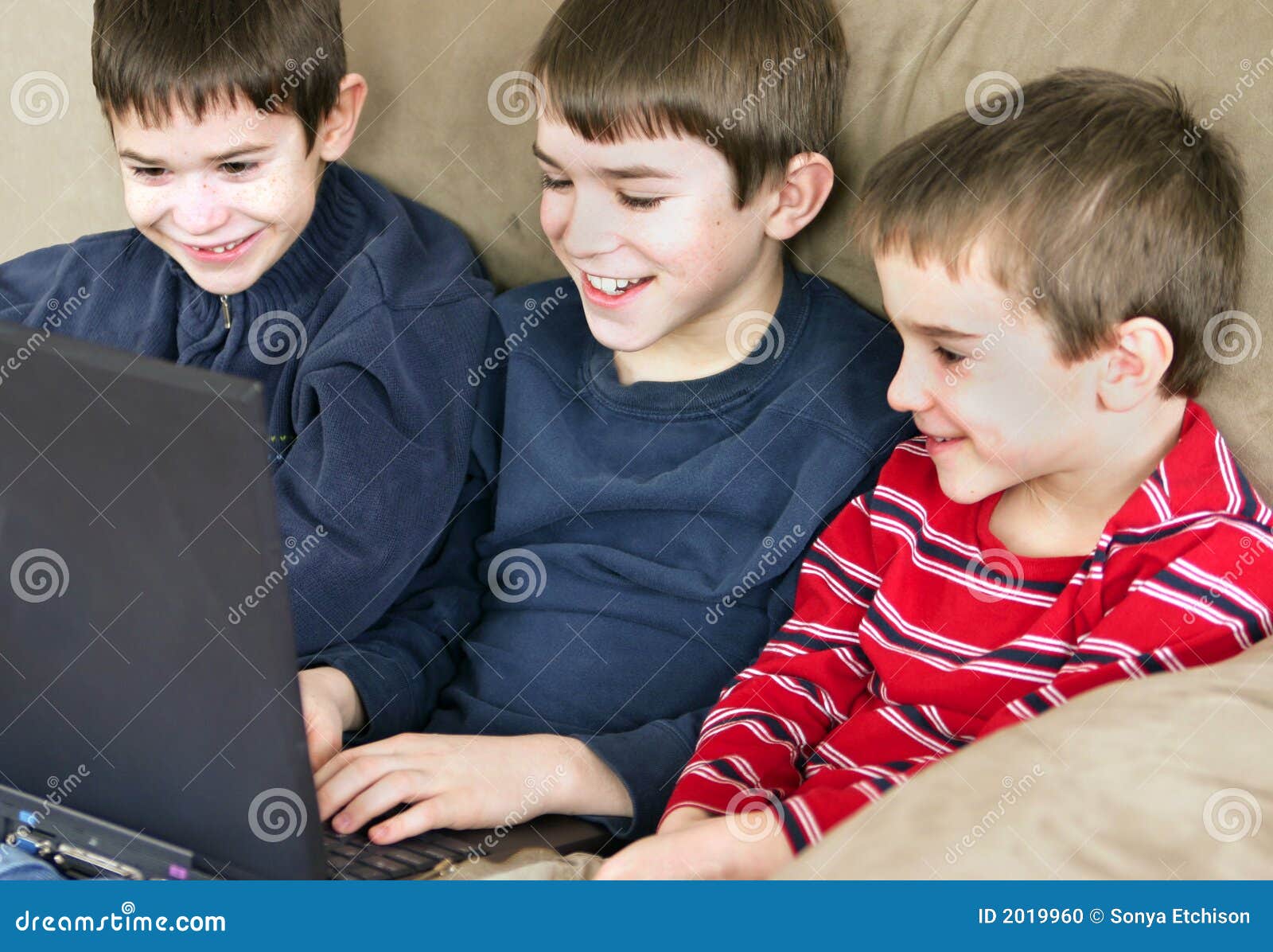 Three Boys Playing stock photo. Image of emotions, group - 2019960