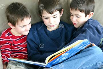 Three Boys Reading stock photo. Image of cheerful, emotion - 1978464