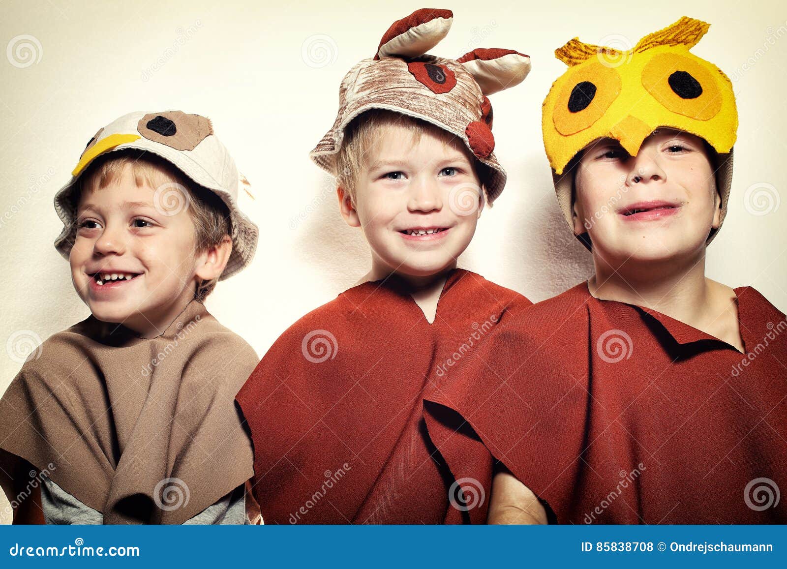 Three Boys Smiling during the Masquerade Stock Photo - Image of cloak ...