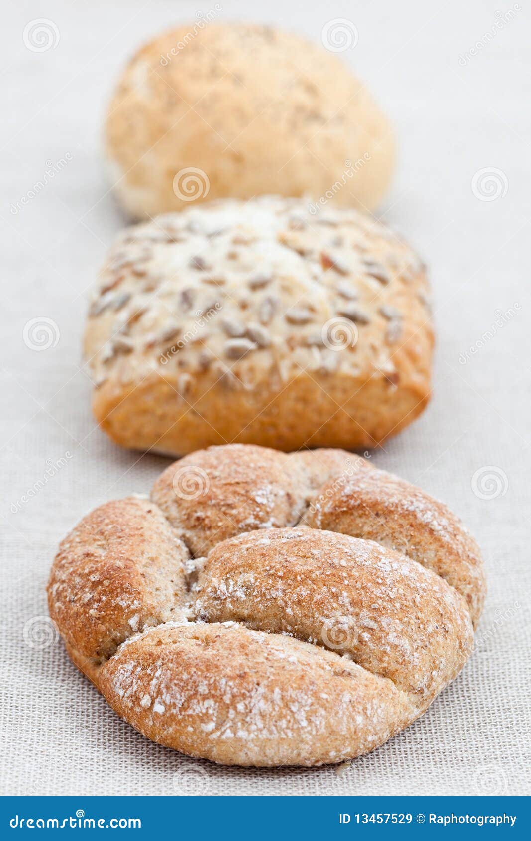 Three bread buns in a row stock image. Image of hessian - 13457529
